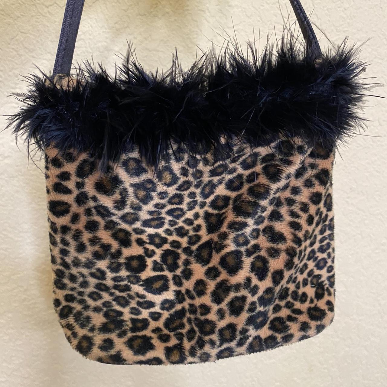Leopard print mini purse with fuzzy trim and zips... - Depop