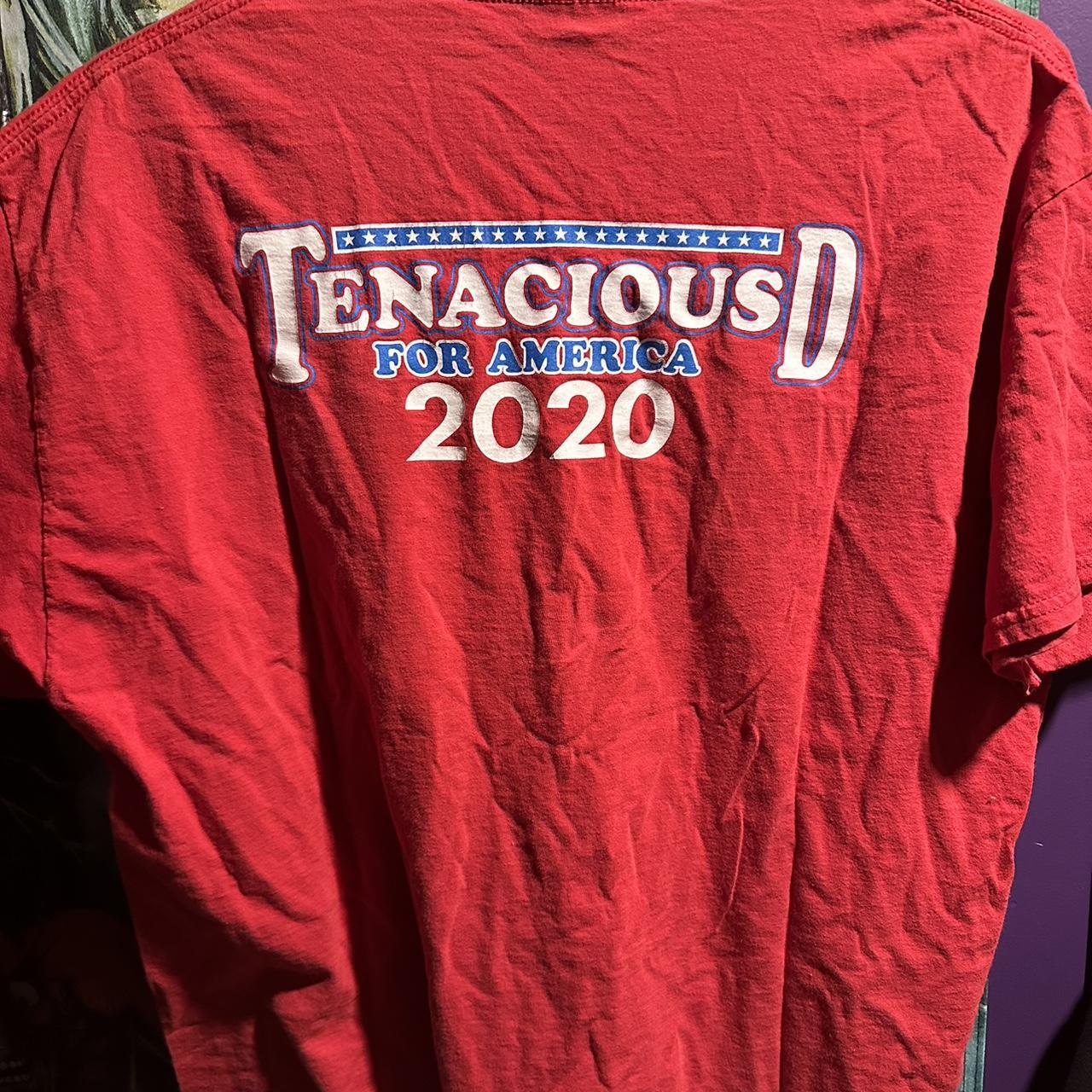 Tenacious D shirt w two small holes on the front... - Depop