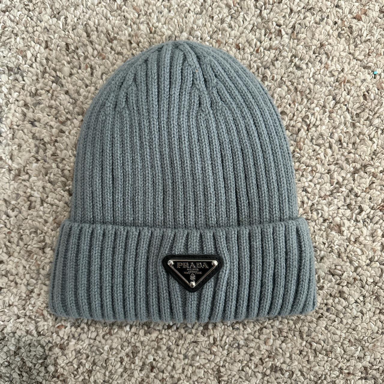 Prada beanie! 10/10 condition Fits all Fluffy on... - Depop
