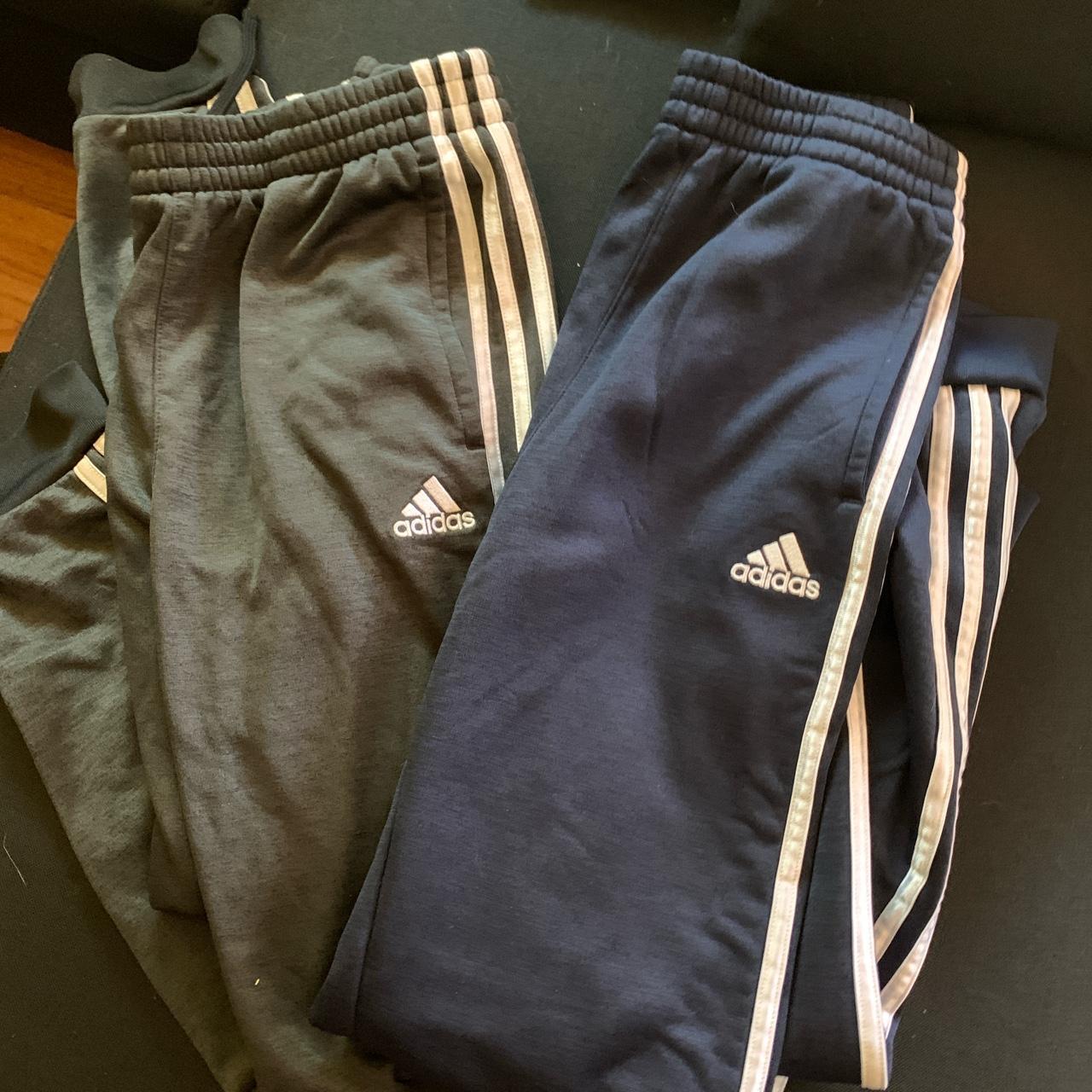 one grey and one black pair of adidas sweats kids... - Depop