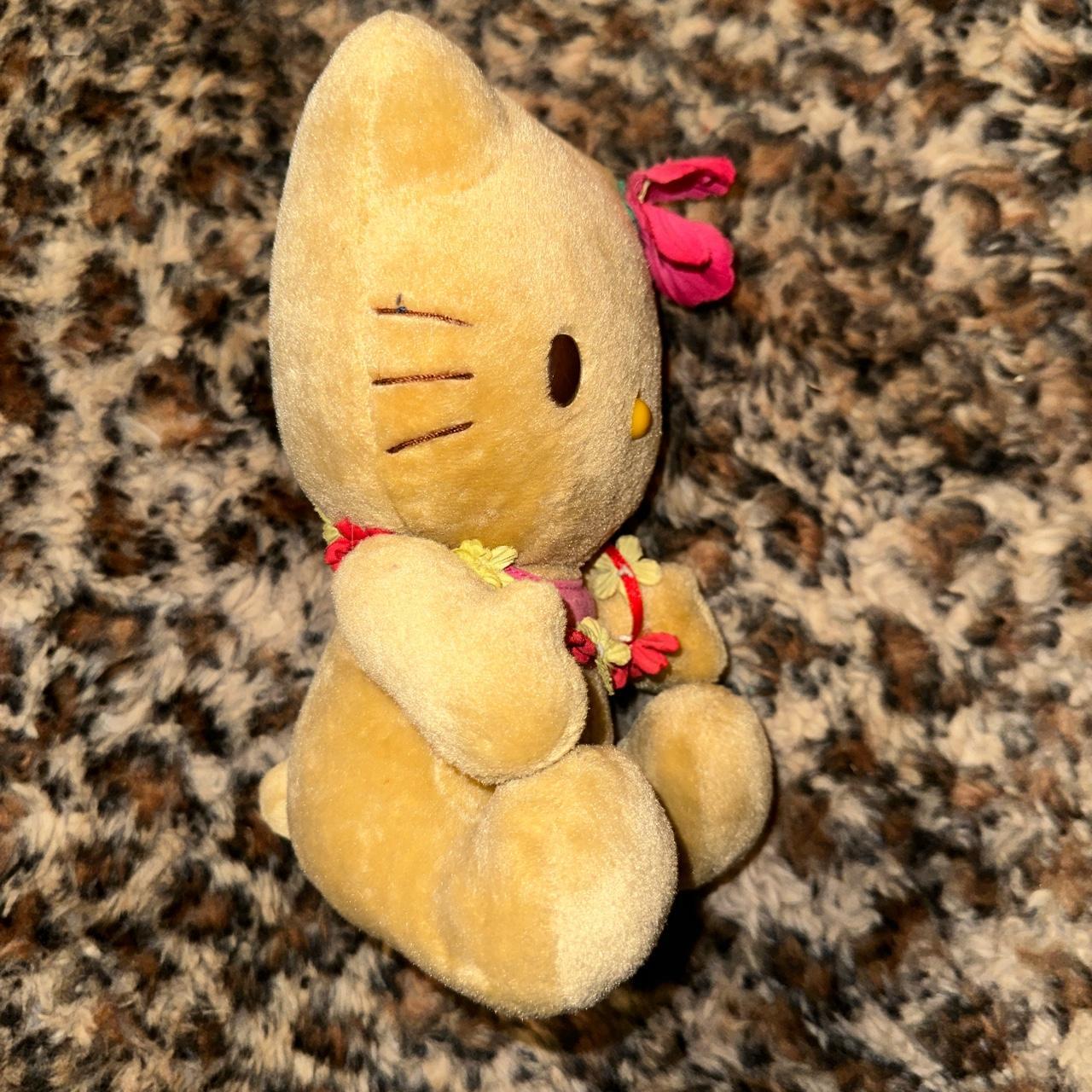 Tan/Hawaiian Hello Kitty :3 she doesn't have a tag... - Depop