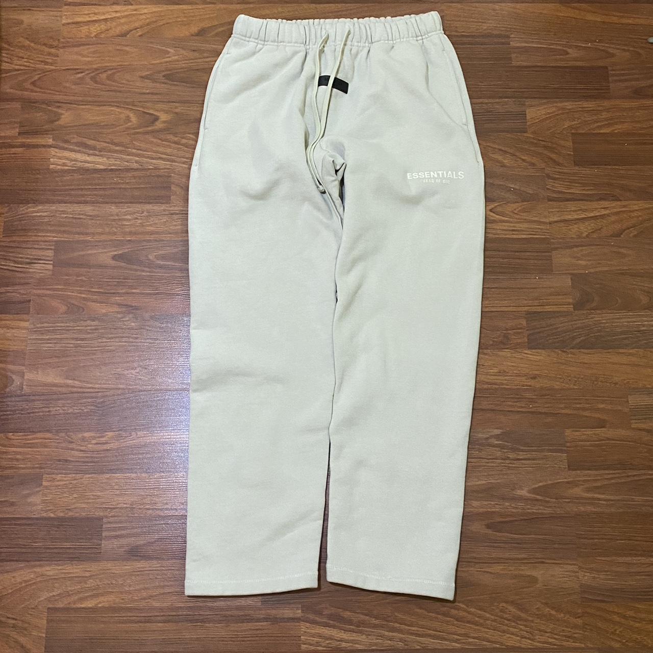 Essentials Cream Sweatpants Open hemmed Size Large... - Depop