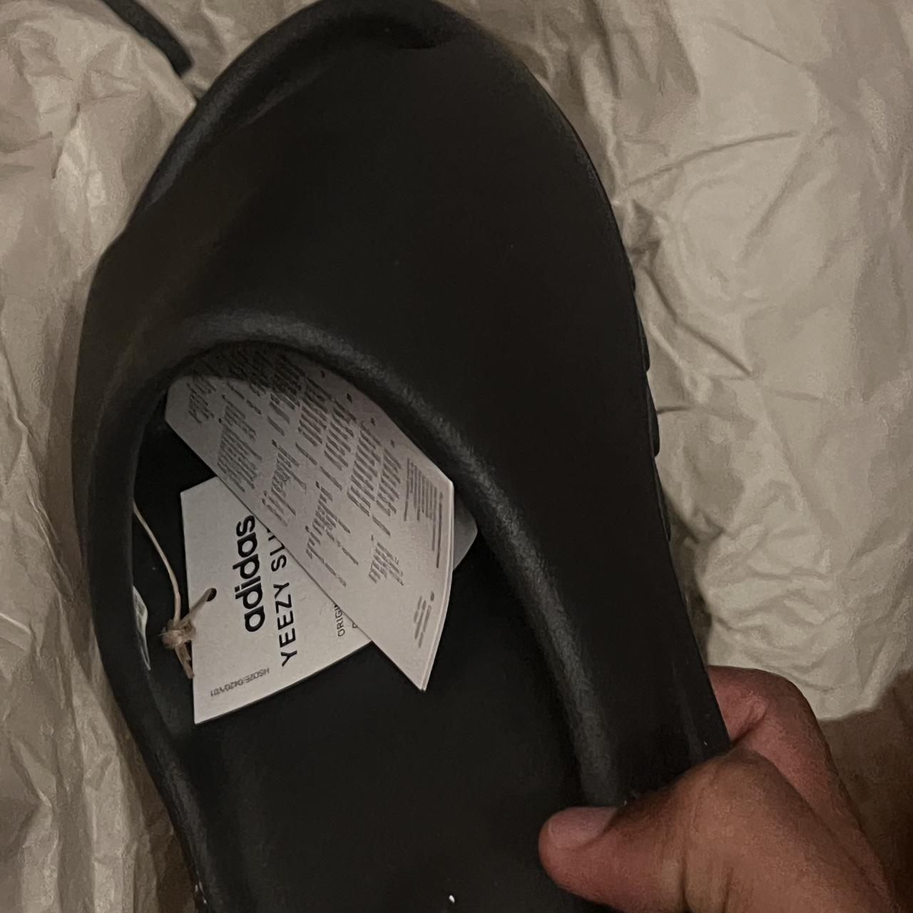 YEEZY SLIDES MATT BLACK . Brand NEW , only opened... - Depop
