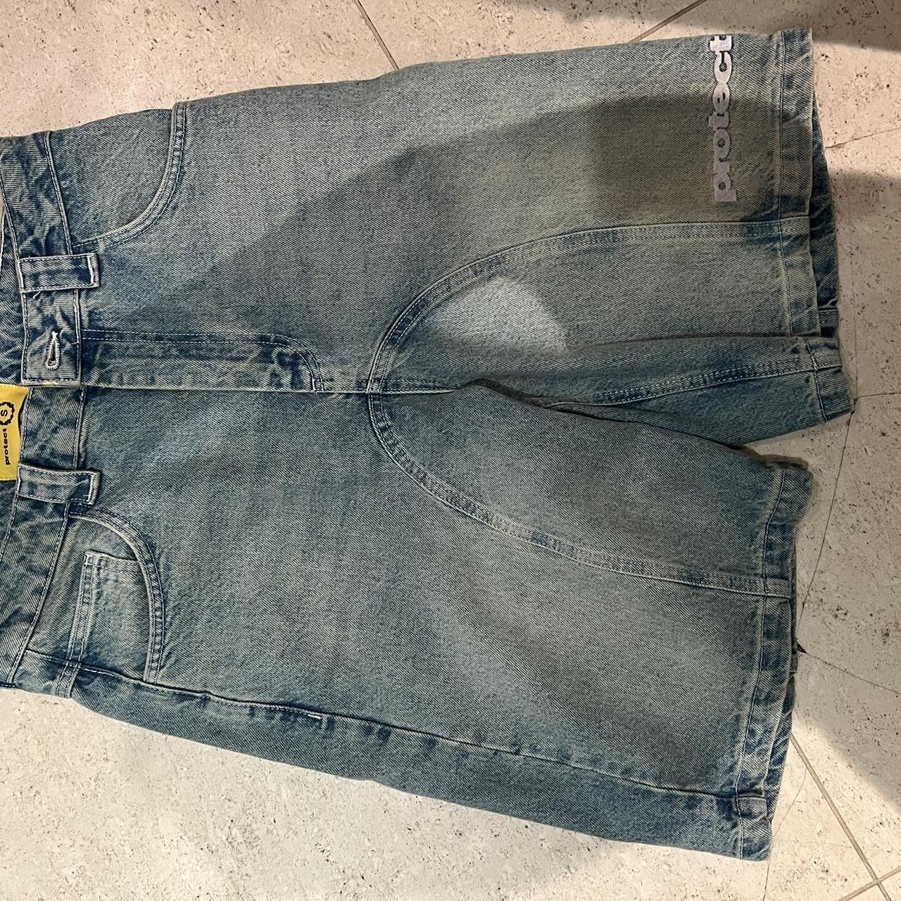 Blue protect jorts Never worn Open to offers... - Depop