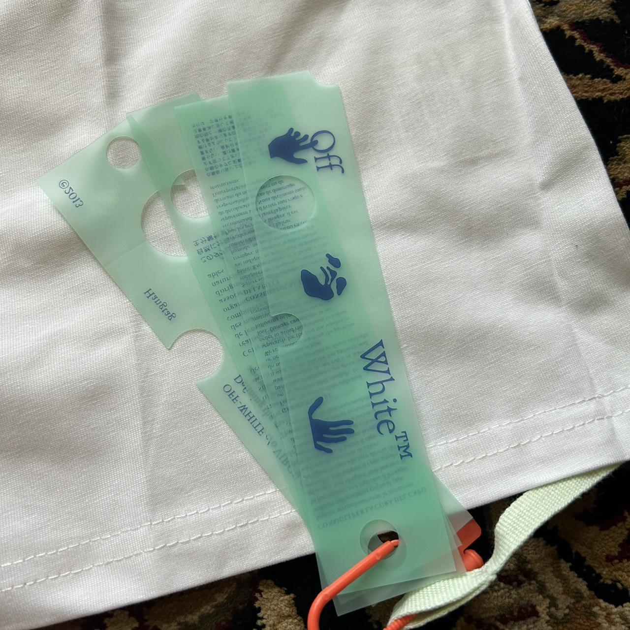 Off White Acrylic Shot Tee (Medium) material is... - Depop