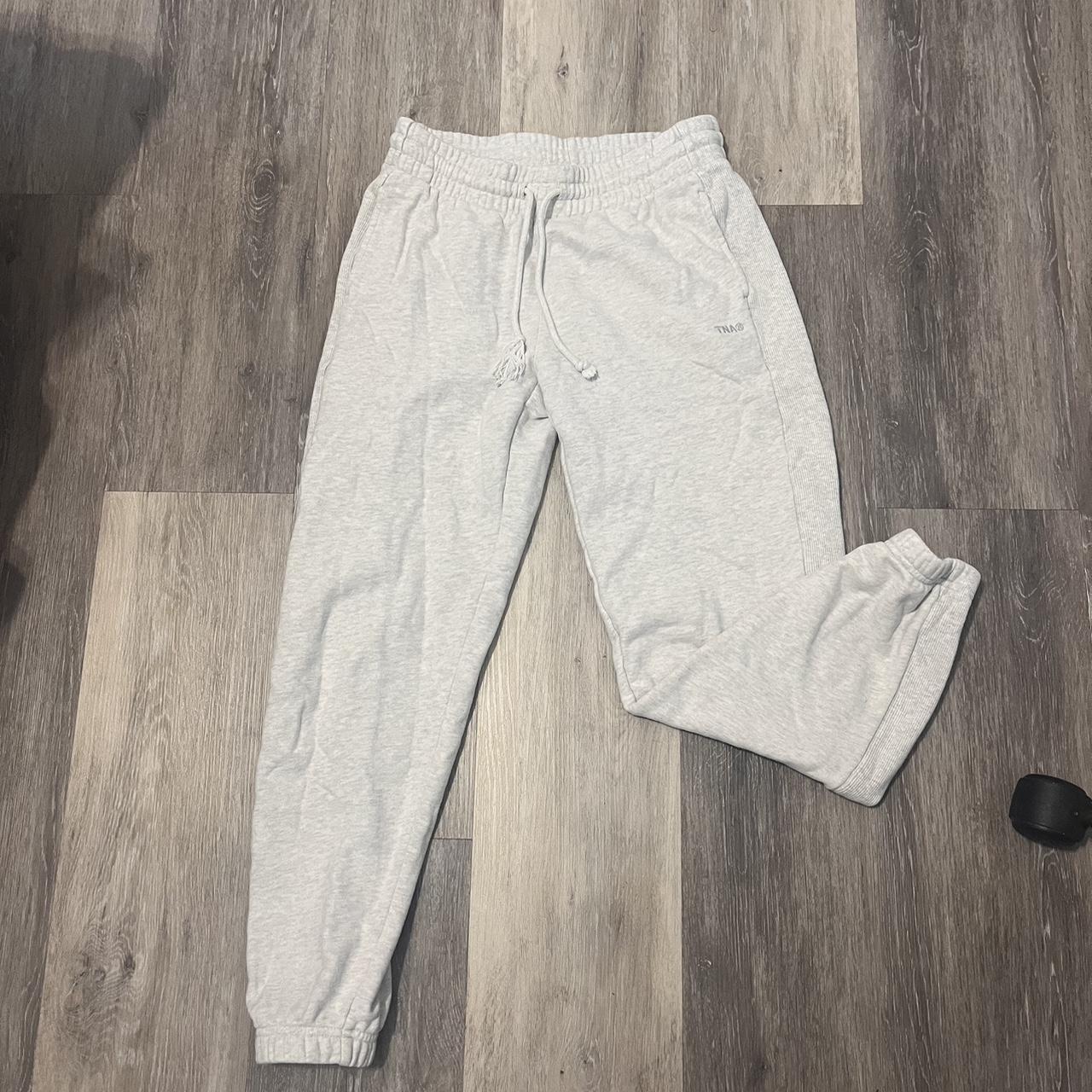 Aritzia grey TNA sweatpants Strings are a little... - Depop