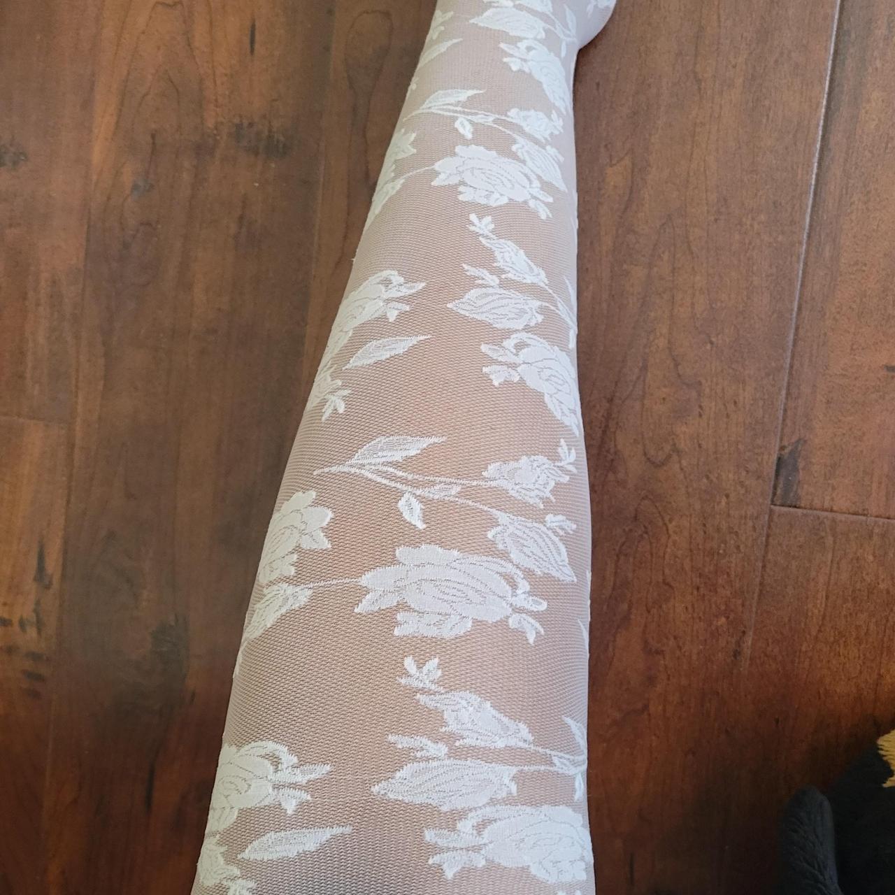 Floral white stockinged size small to medium - Depop