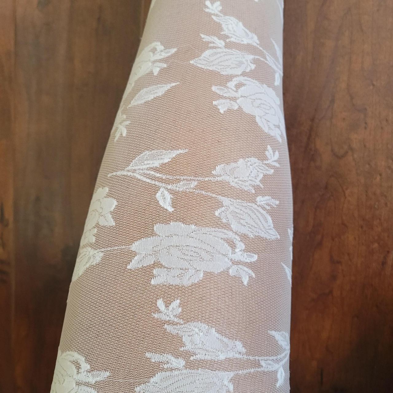 Floral white stockinged size small to medium - Depop