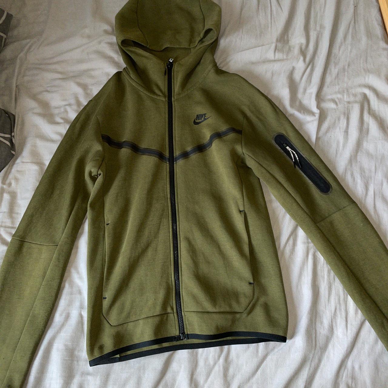 Green Nike tech fleece jacket in a xs minor defect... - Depop
