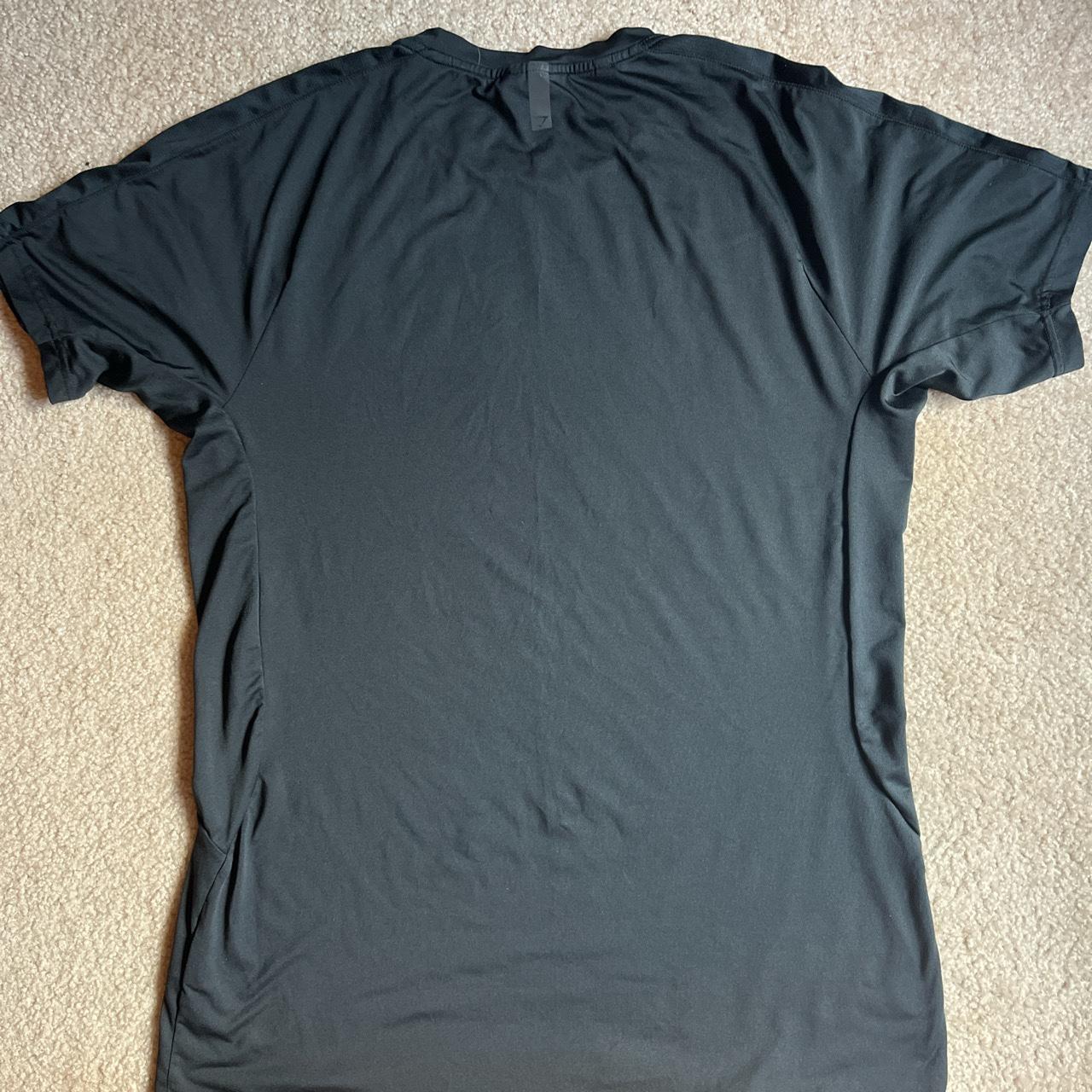 All black Gymshark dry fit shirt Like new Fits to size - Depop