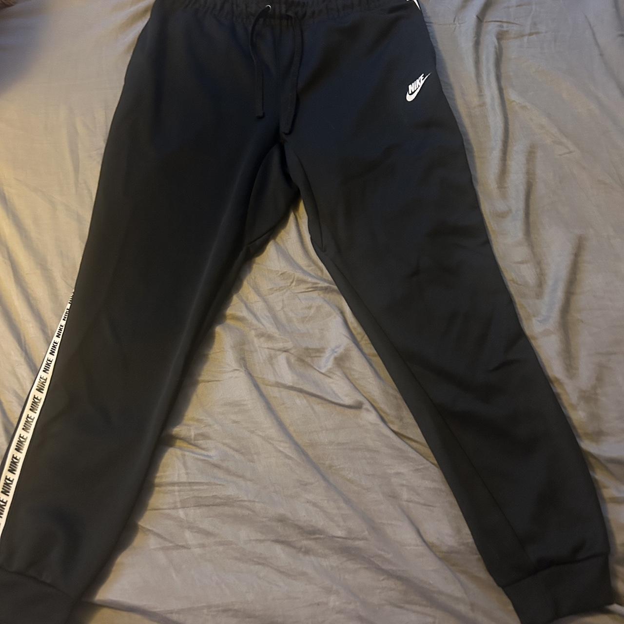 black Nike sweat pants - Depop