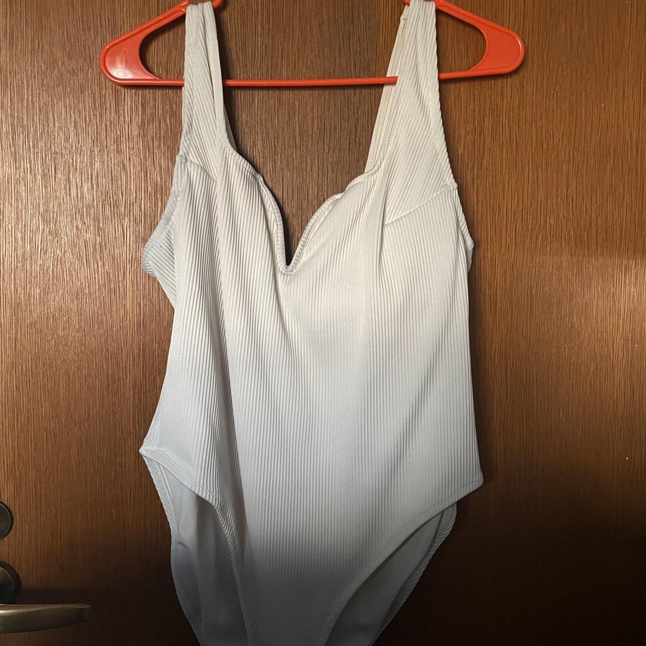 Cream colored bathing suit with a waffle pattern.... - Depop