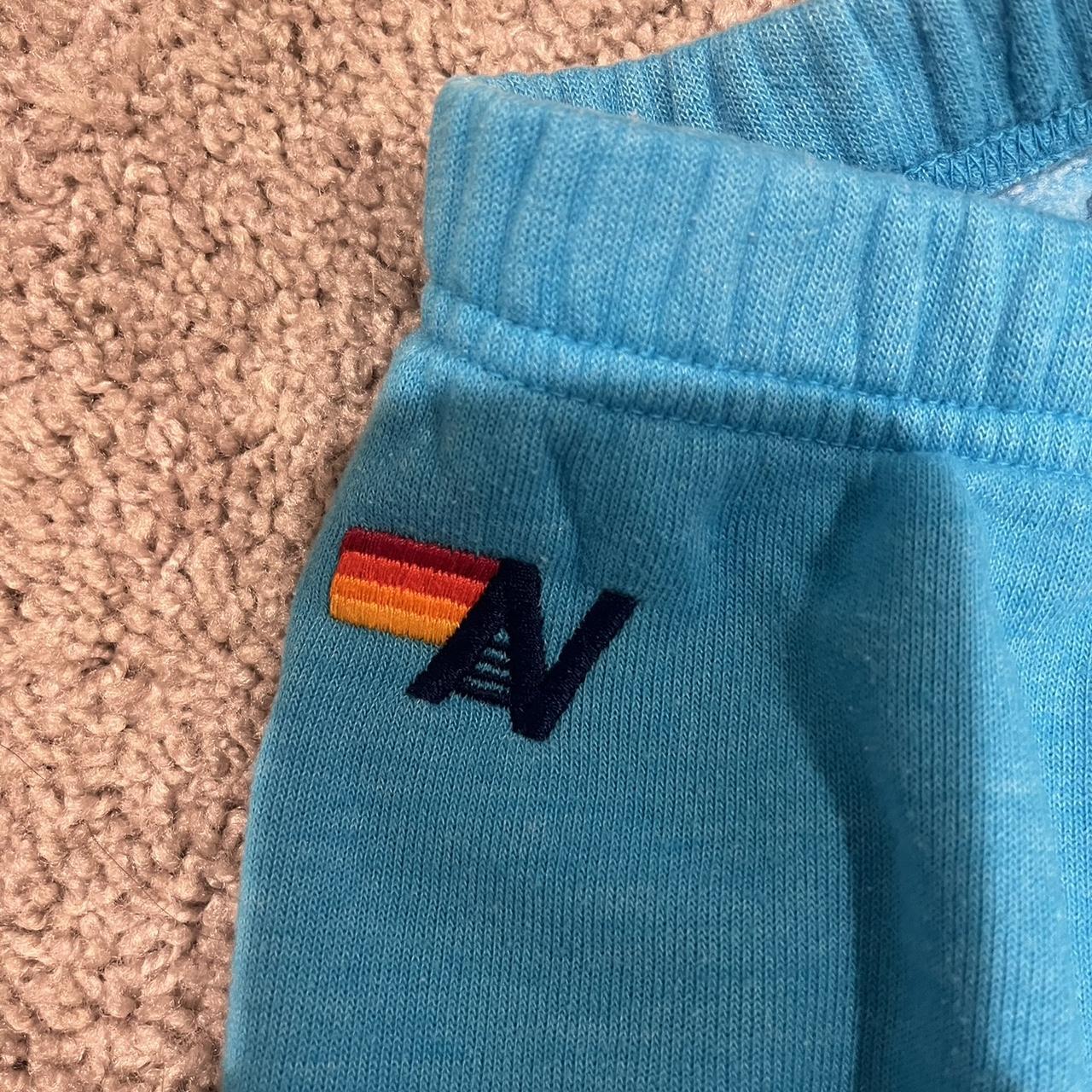 blue aviator nation sweatpants with a pink lightning... - Depop