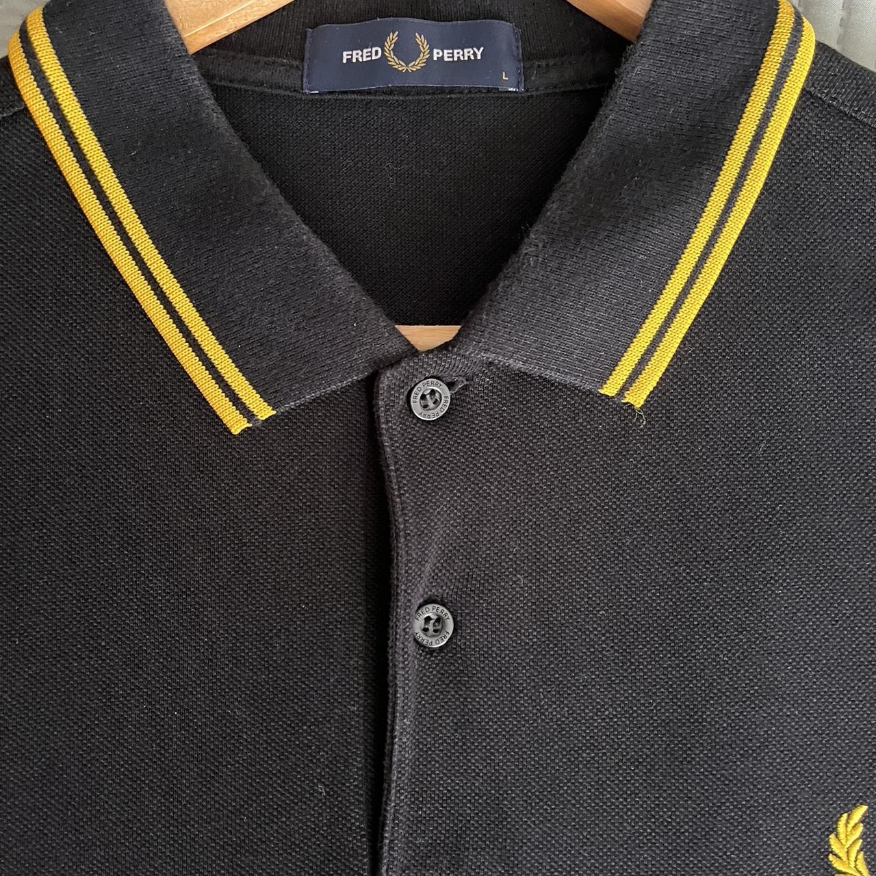 Fred Perry black and yellow polo like new In large - Depop