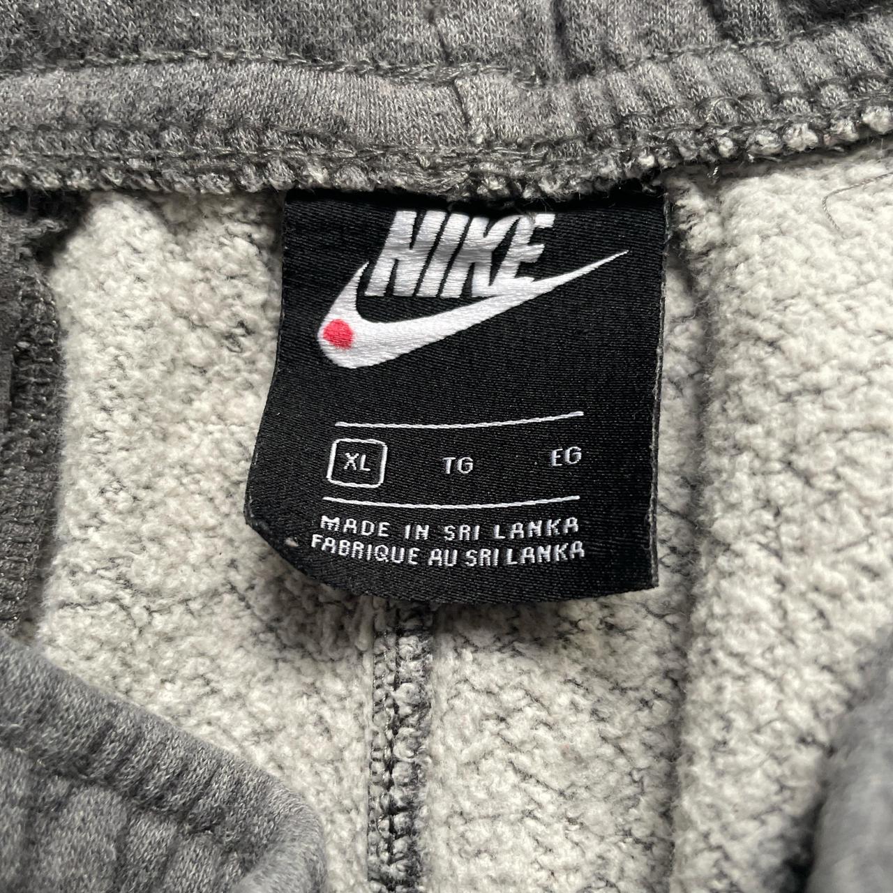 Grey Nike baggy/loose sweatpants logo messed up a... | Depop