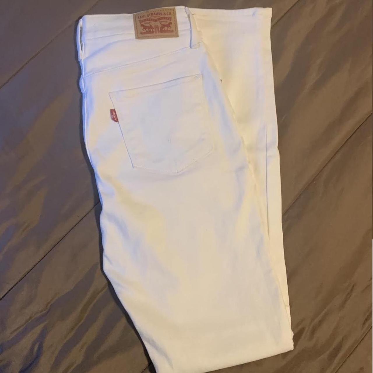 The cutest staple white Levi jeans! Such a staple... - Depop