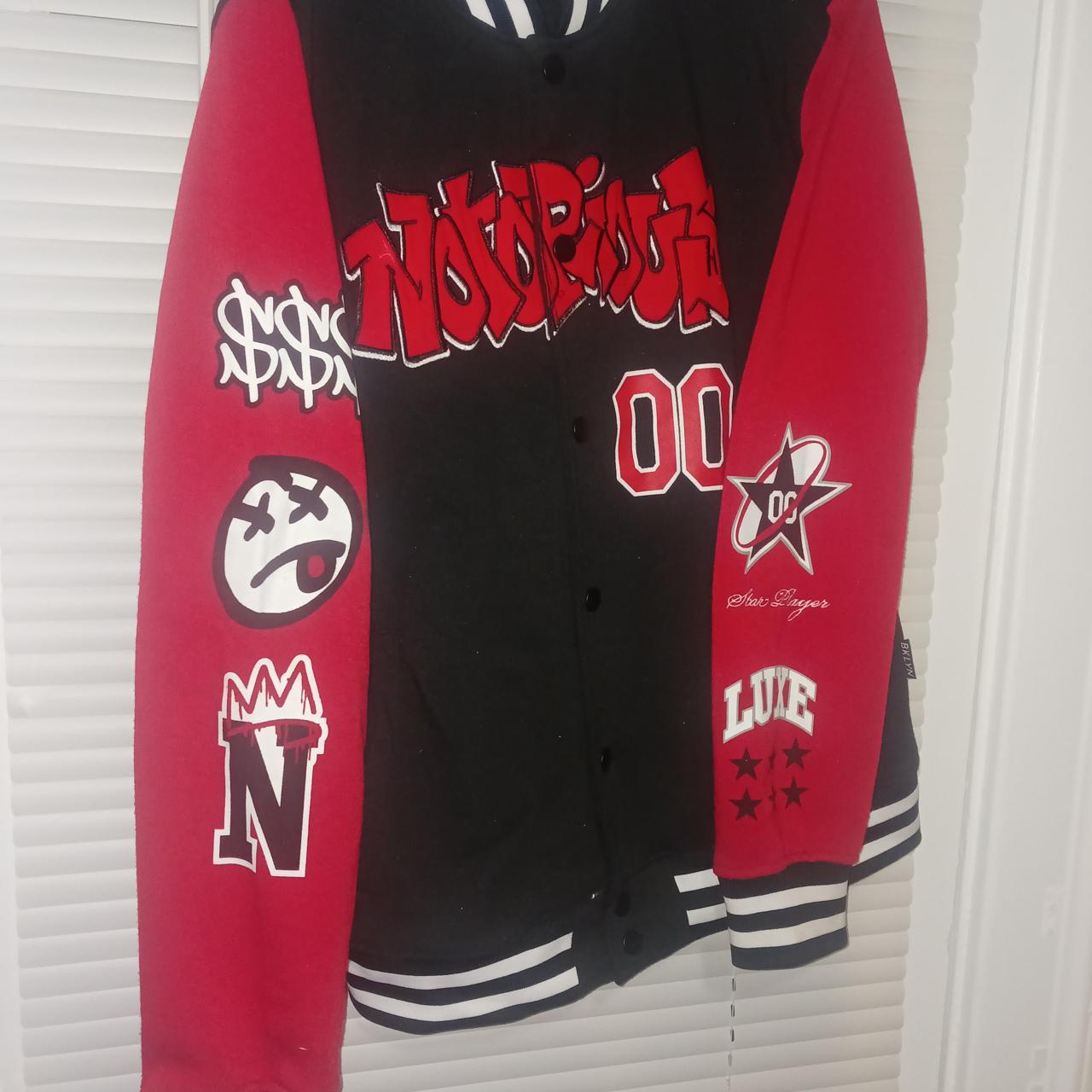 Red and black varsity jacket lightly used | Depop