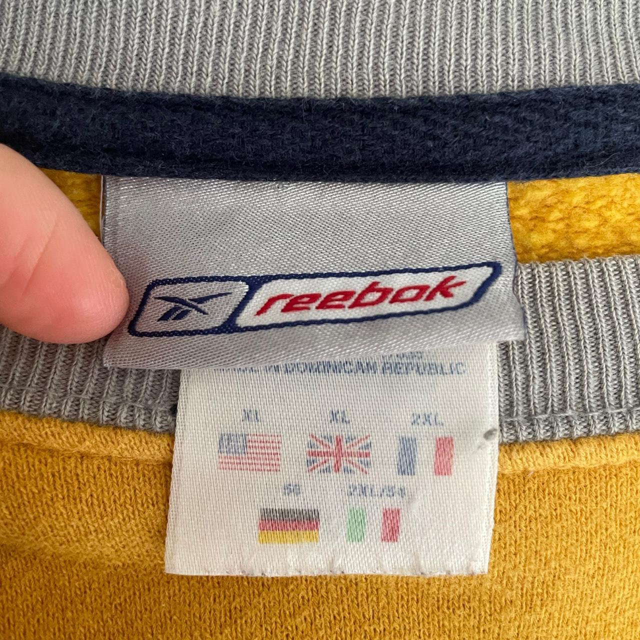 Vintage Reebok yellow and navy streetwear... | Depop