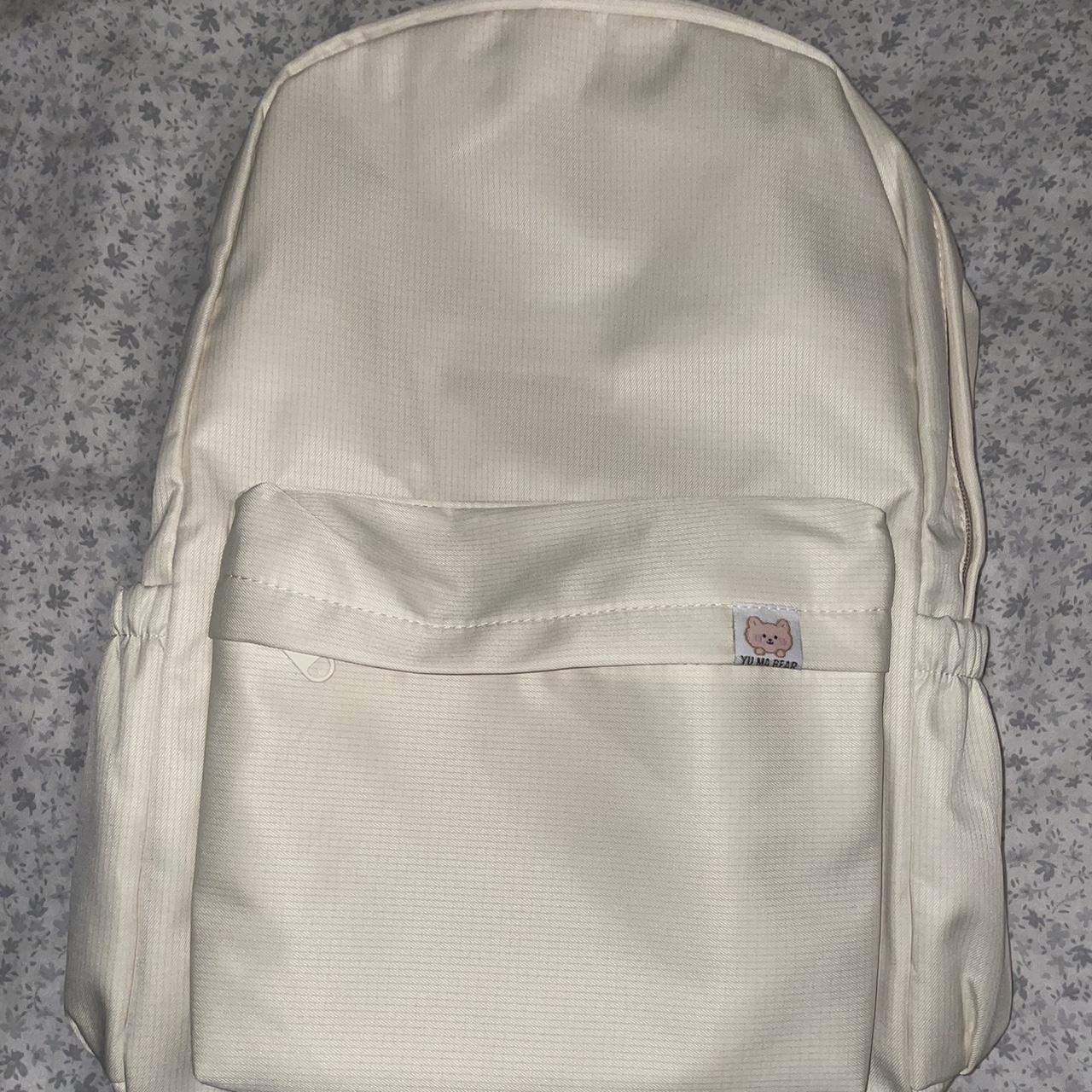 Cream and white backpack with a cute bear design... - Depop