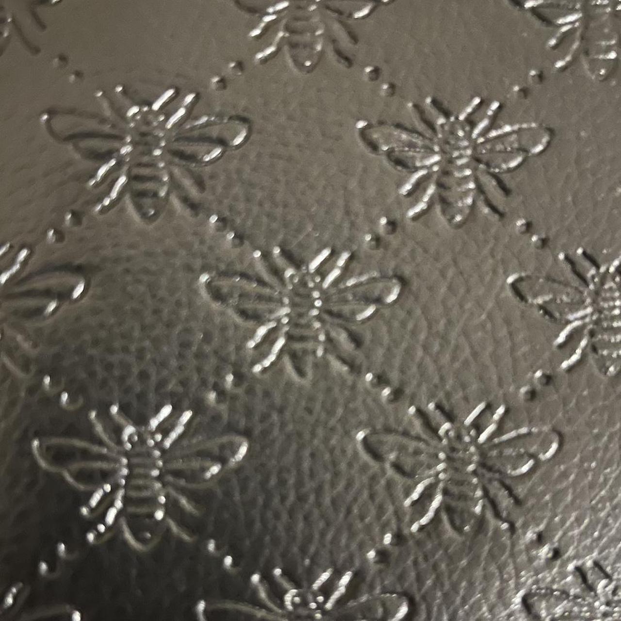 Bee Wallet The black wallet showcases a playful... - Depop