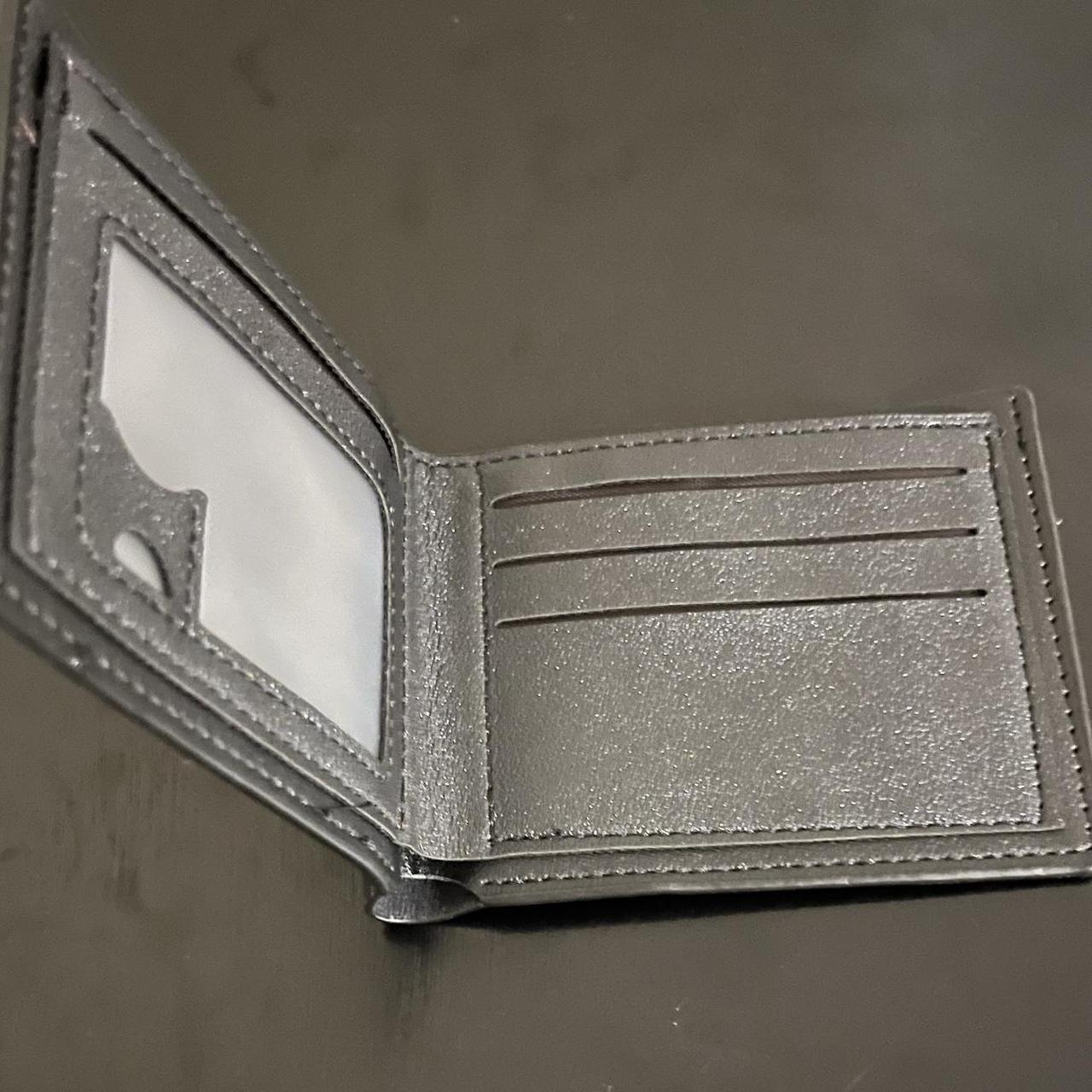 Bee Wallet The black wallet showcases a playful... - Depop