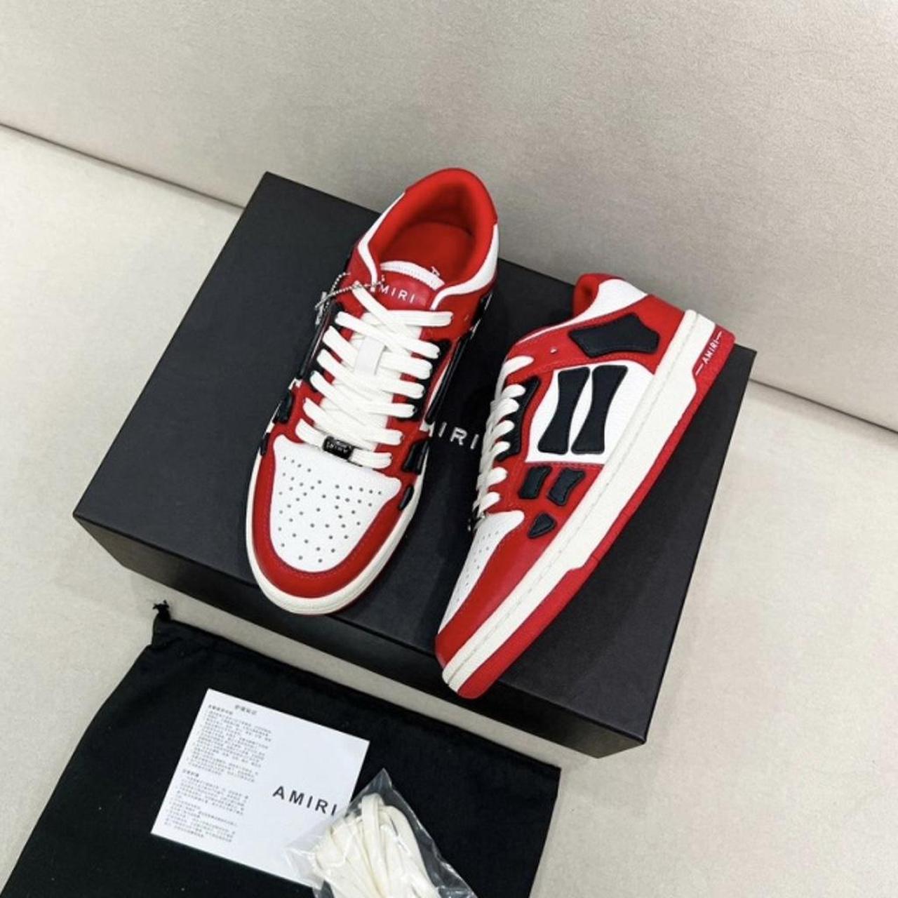 Red and black Amiri low top trainers #Amiri | Depop