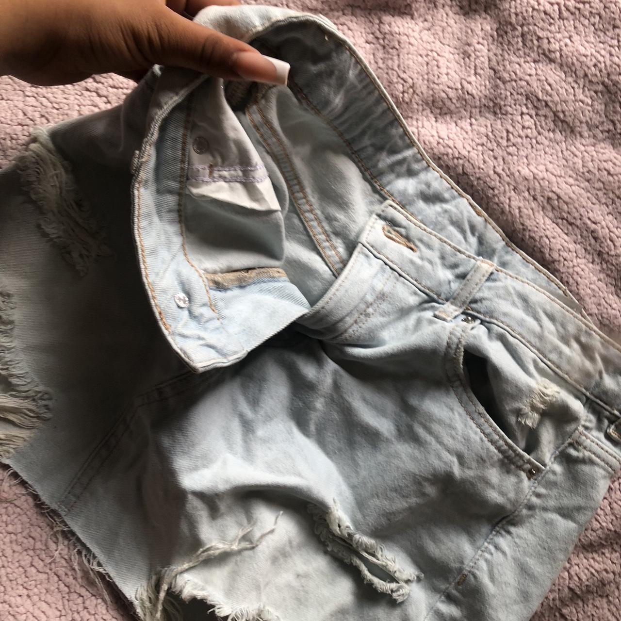 S/M mini I ripped denim skirt light blue - Depop