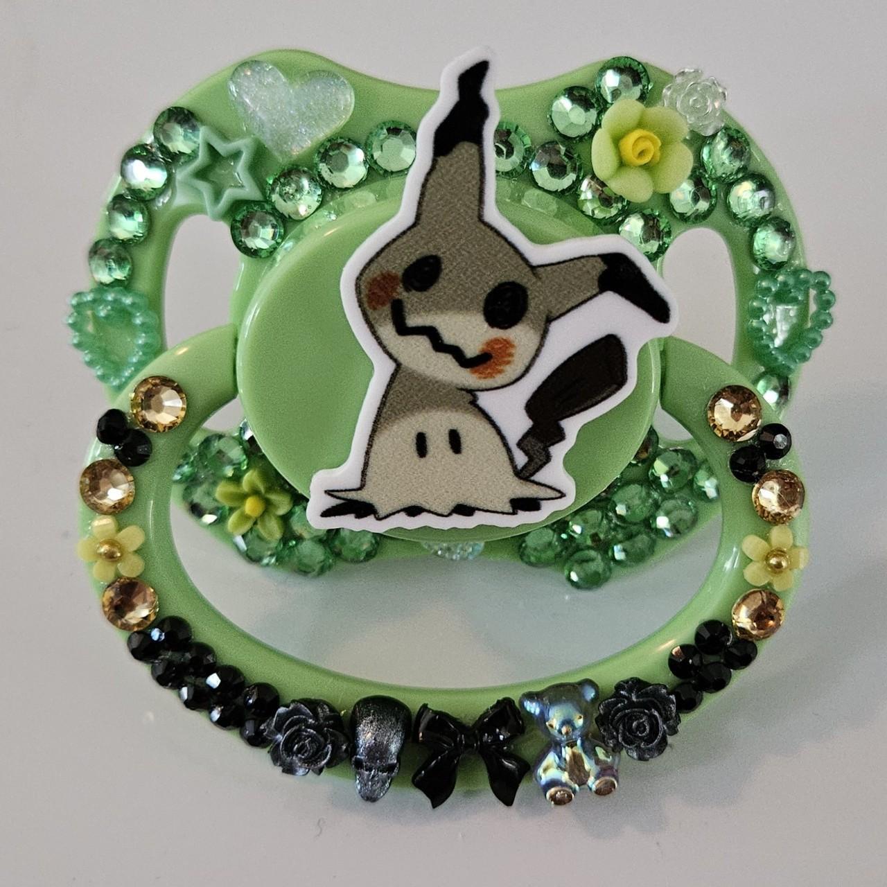 Green Mimikyu decorated Adult pacifier for age... | Depop