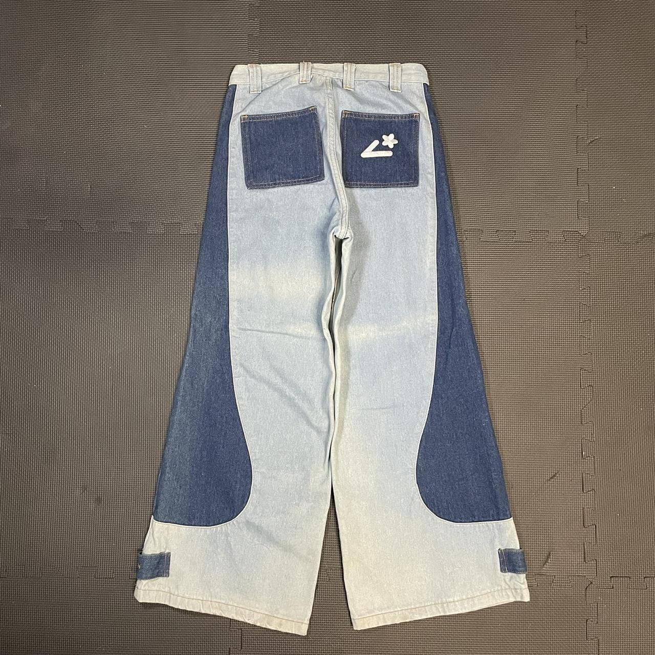 30/30 liquid lagoon flares, worn once Light heelbite... - Depop