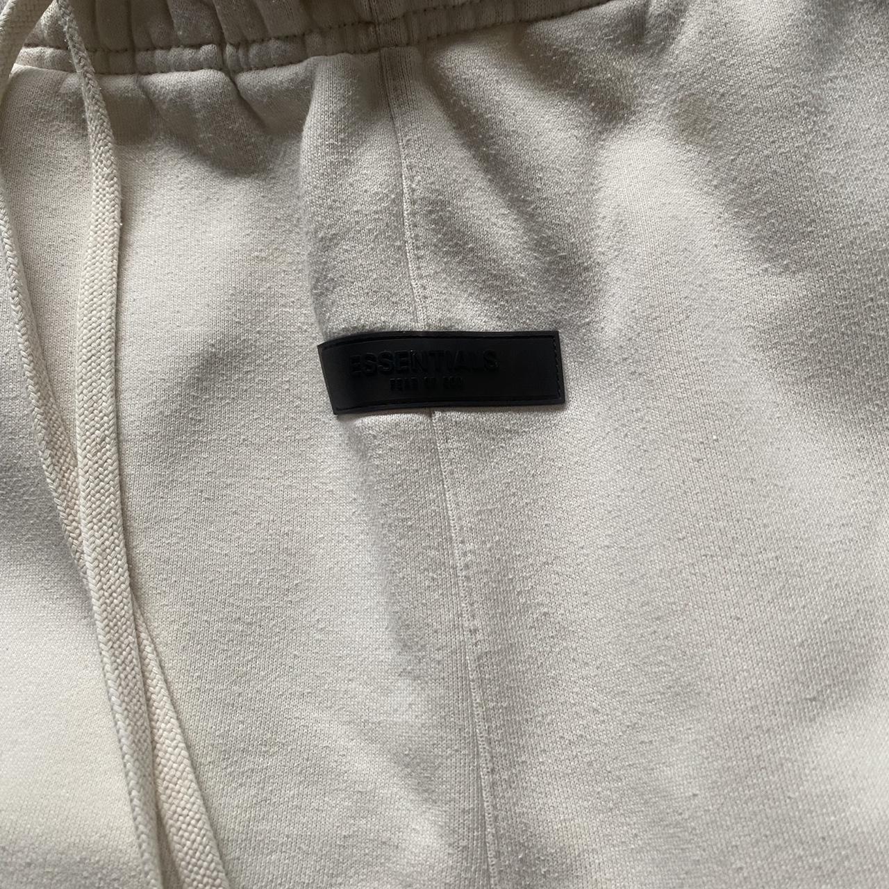Cream Essentials sweatpants #sweatpants #fearofgod... - Depop