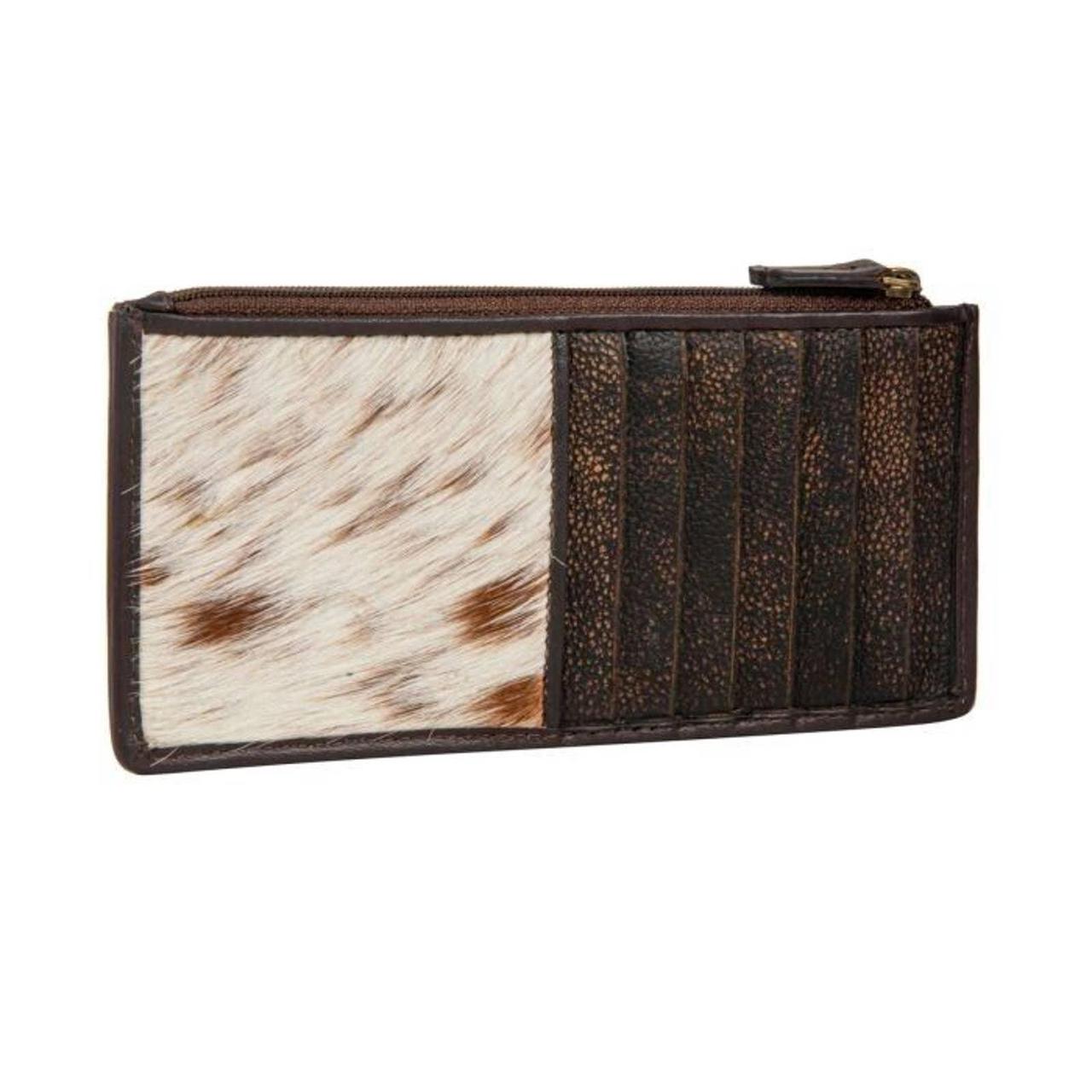 This stylish hair-on hide wallet features special... - Depop