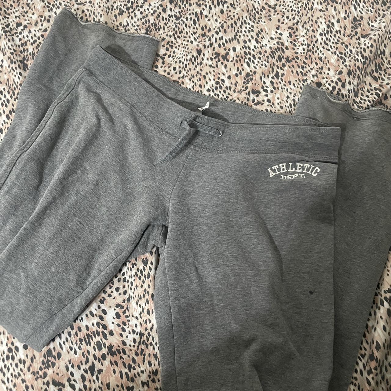 Grey athletic dept low rise sweats w/ minor black... | Depop
