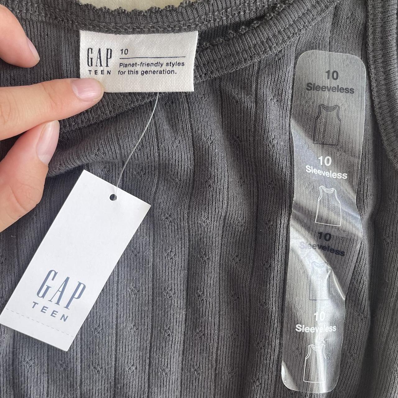 small grey gap tank, fits s-m, perf for fall/winter... - Depop