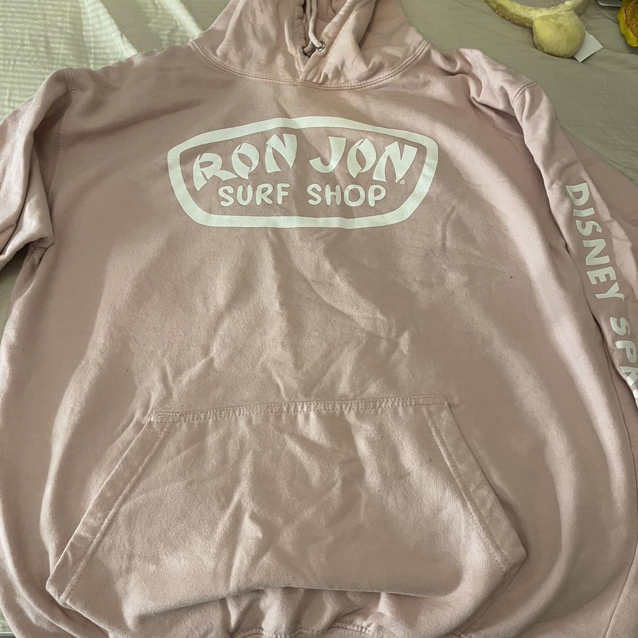 Baby pink ron Jon hoodie it has two really small... - Depop