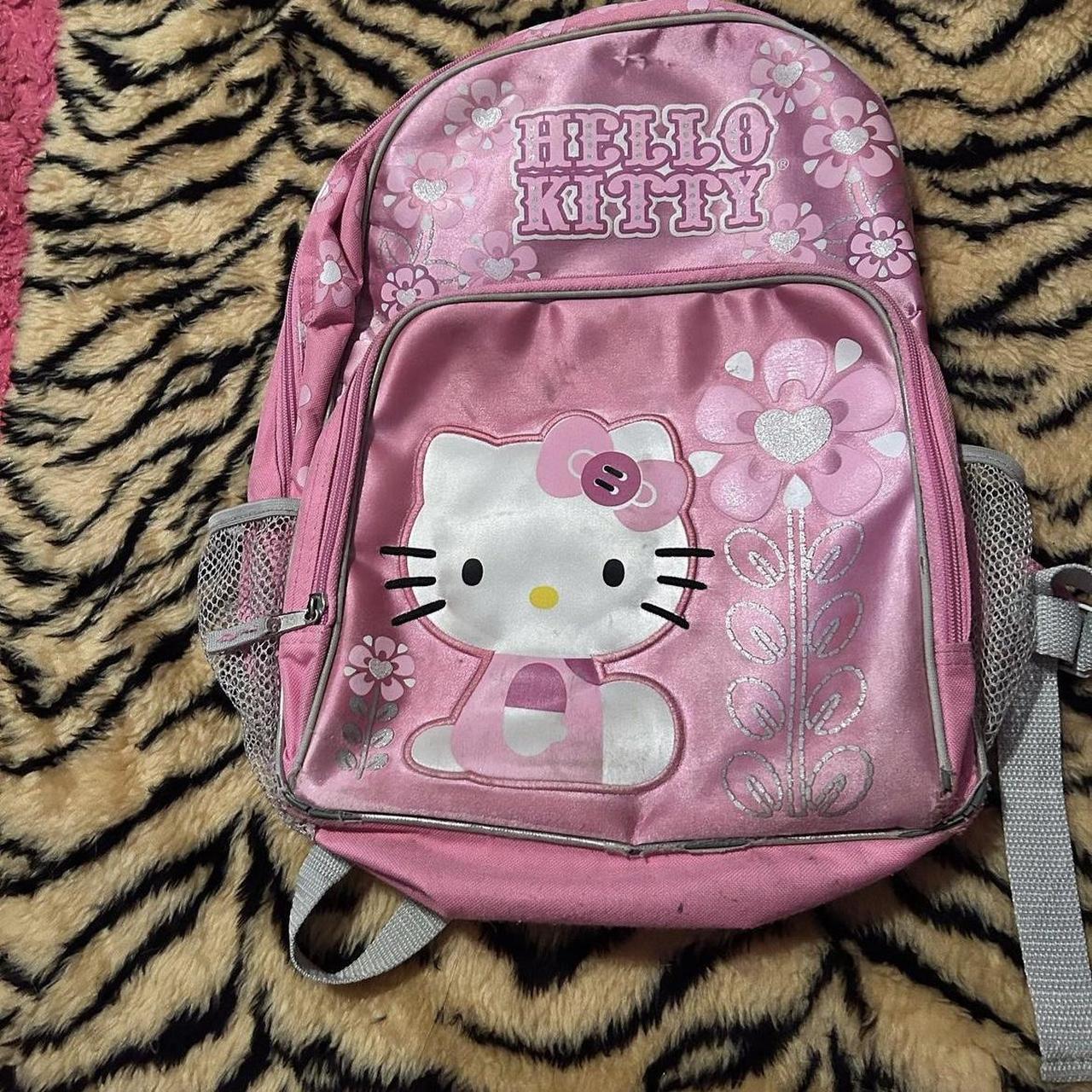 Hello kitty full size backpack with small damages... - Depop