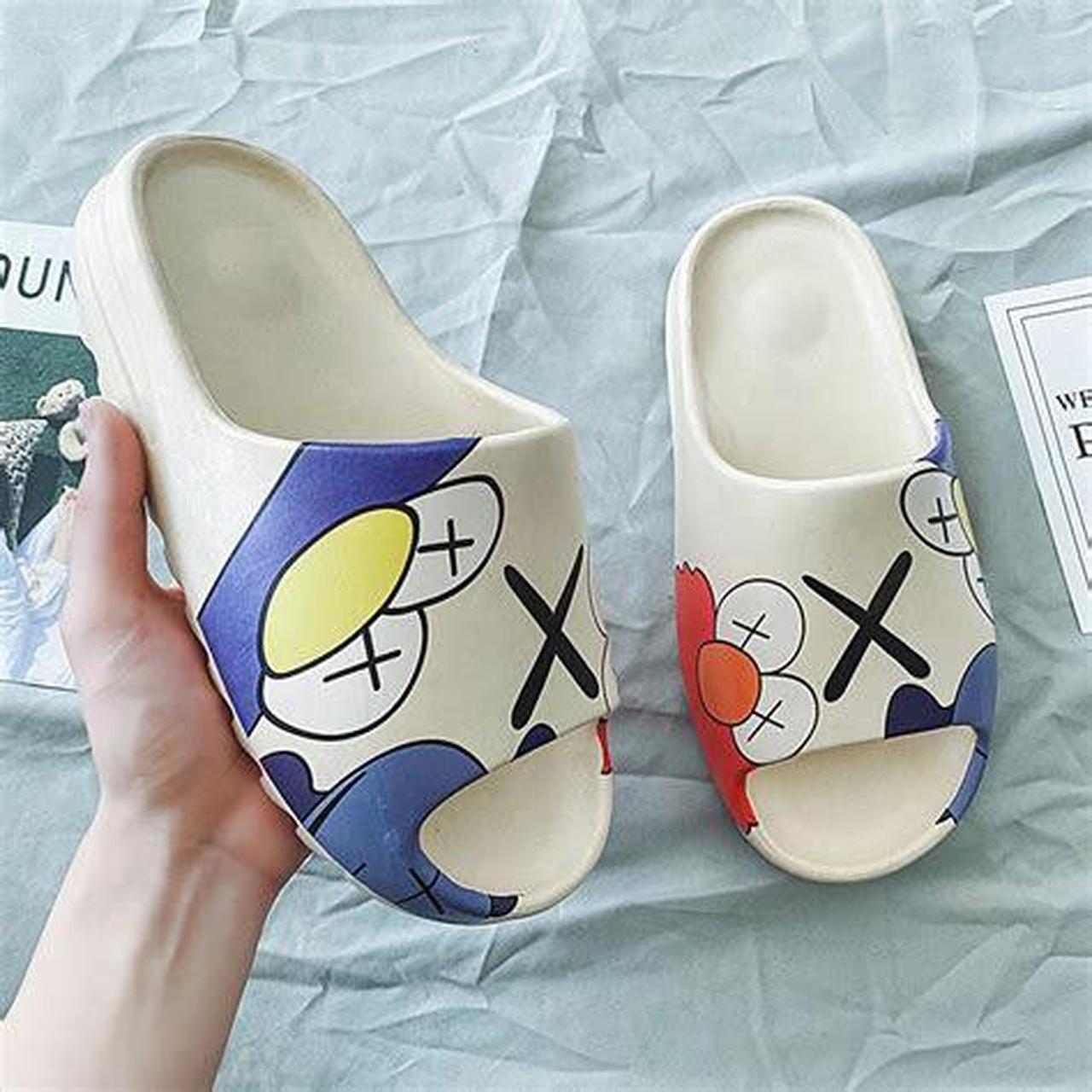 Kaws Slides Dead stock Most sizes available - Depop