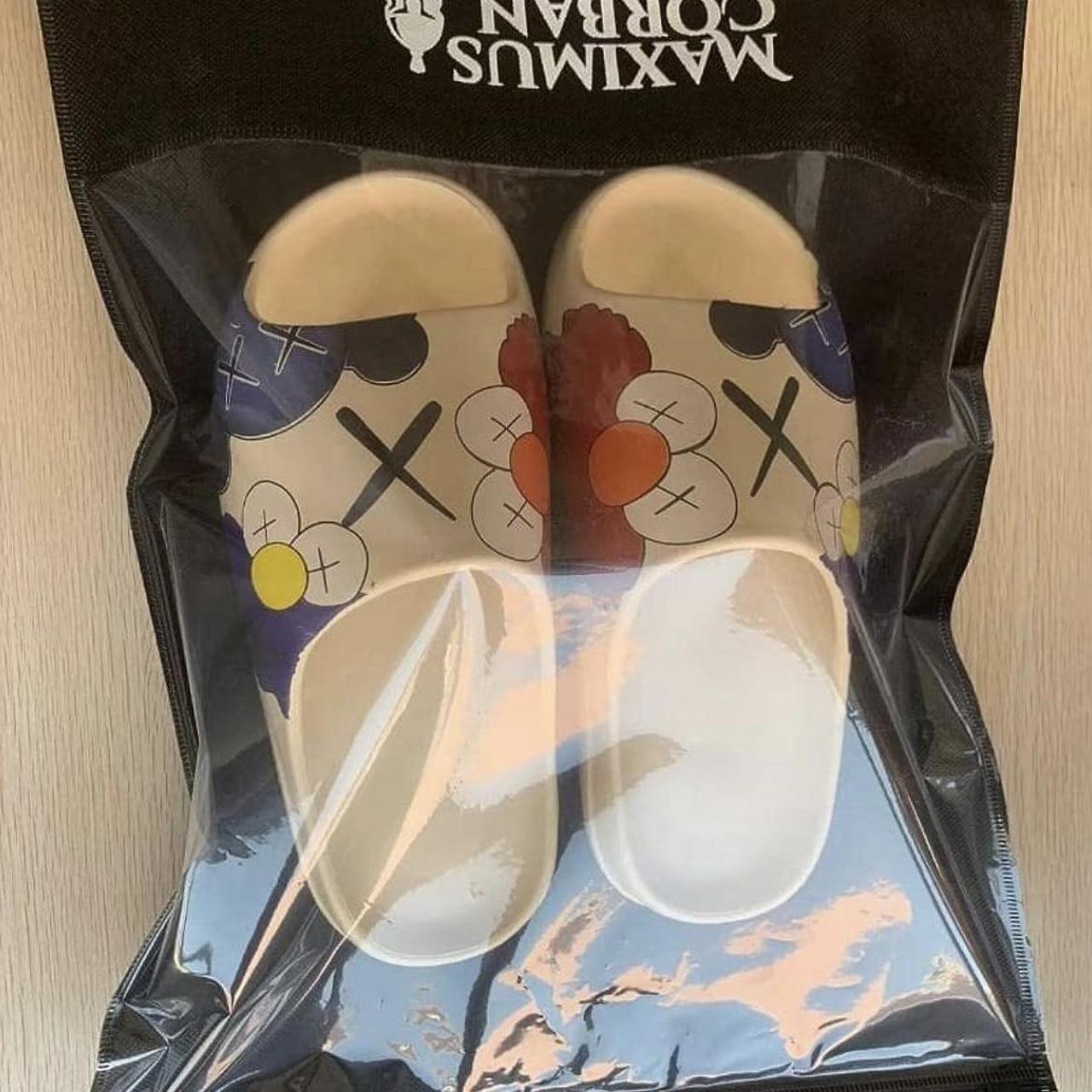 Kaws Slides Dead stock Most sizes available - Depop