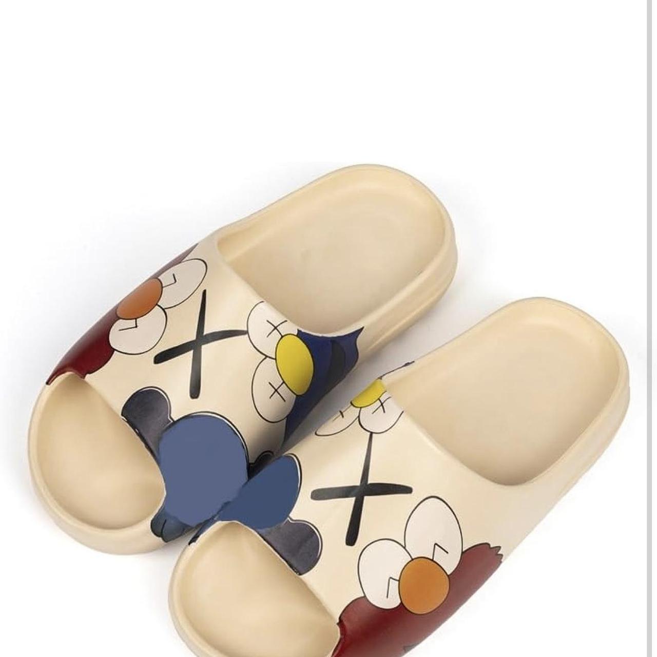 Kaws Slides Dead stock Most sizes available - Depop