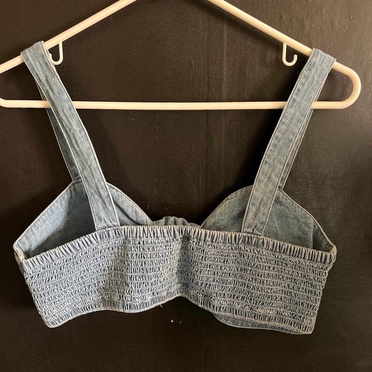 I wear a bra size 32DD and this fits perfect. It... - Depop