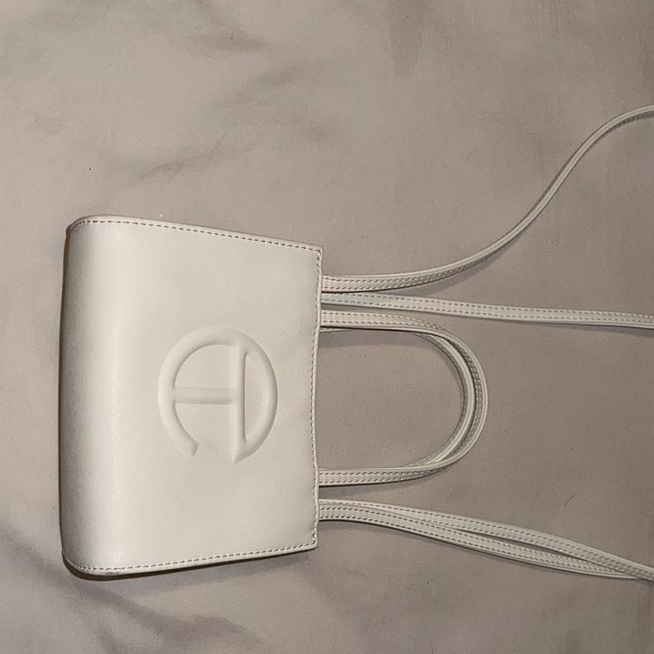 white mini telfar bag. Eyebrow pencil marks on the... - Depop