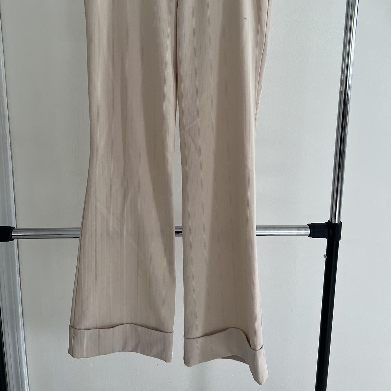 cream colored pants size — 7 *** minor black stain... - Depop