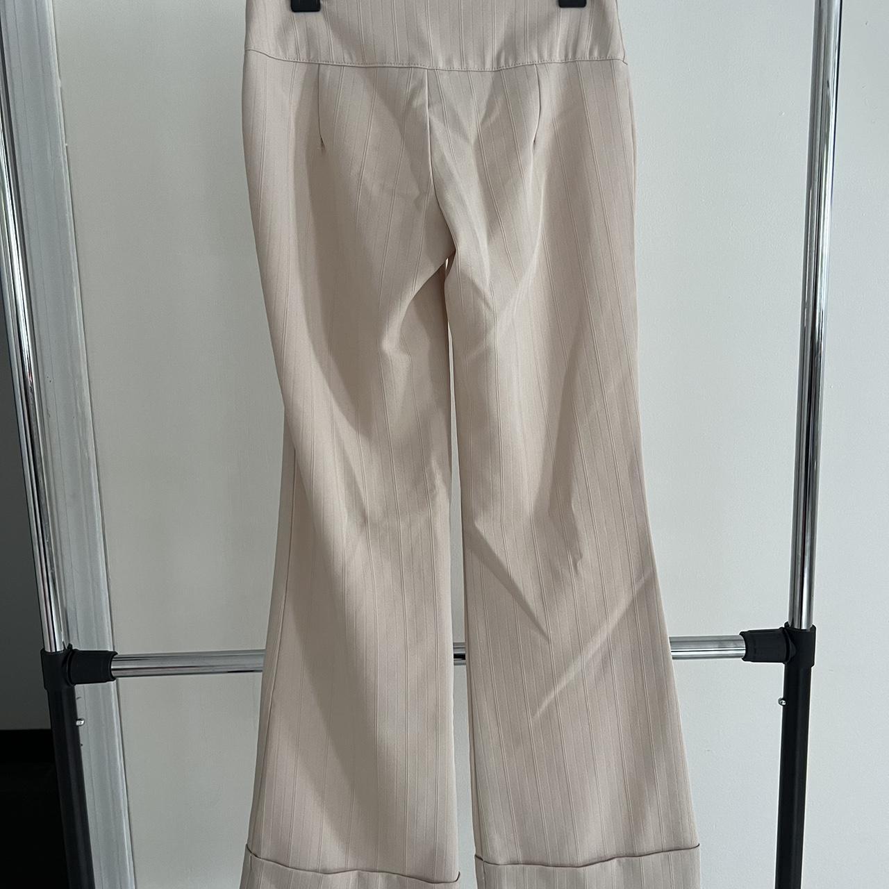 cream colored pants size — 7 *** minor black stain... - Depop