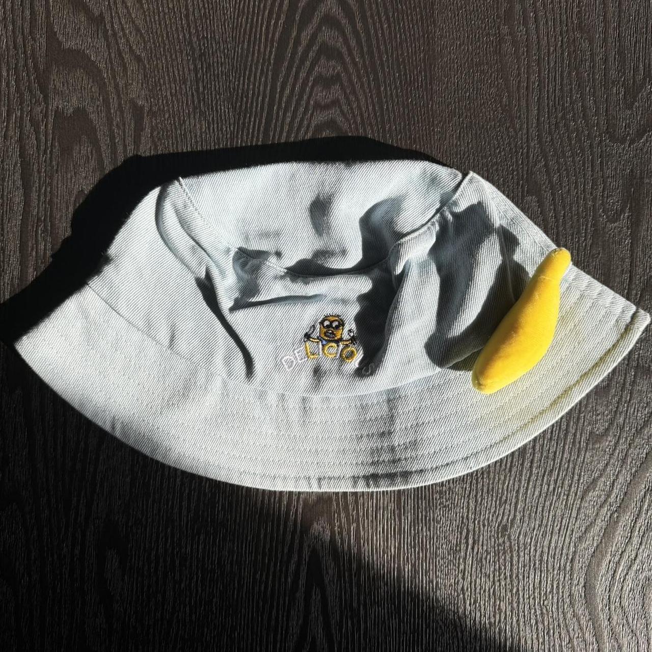 miniso minion bucket hat - never worn - Depop