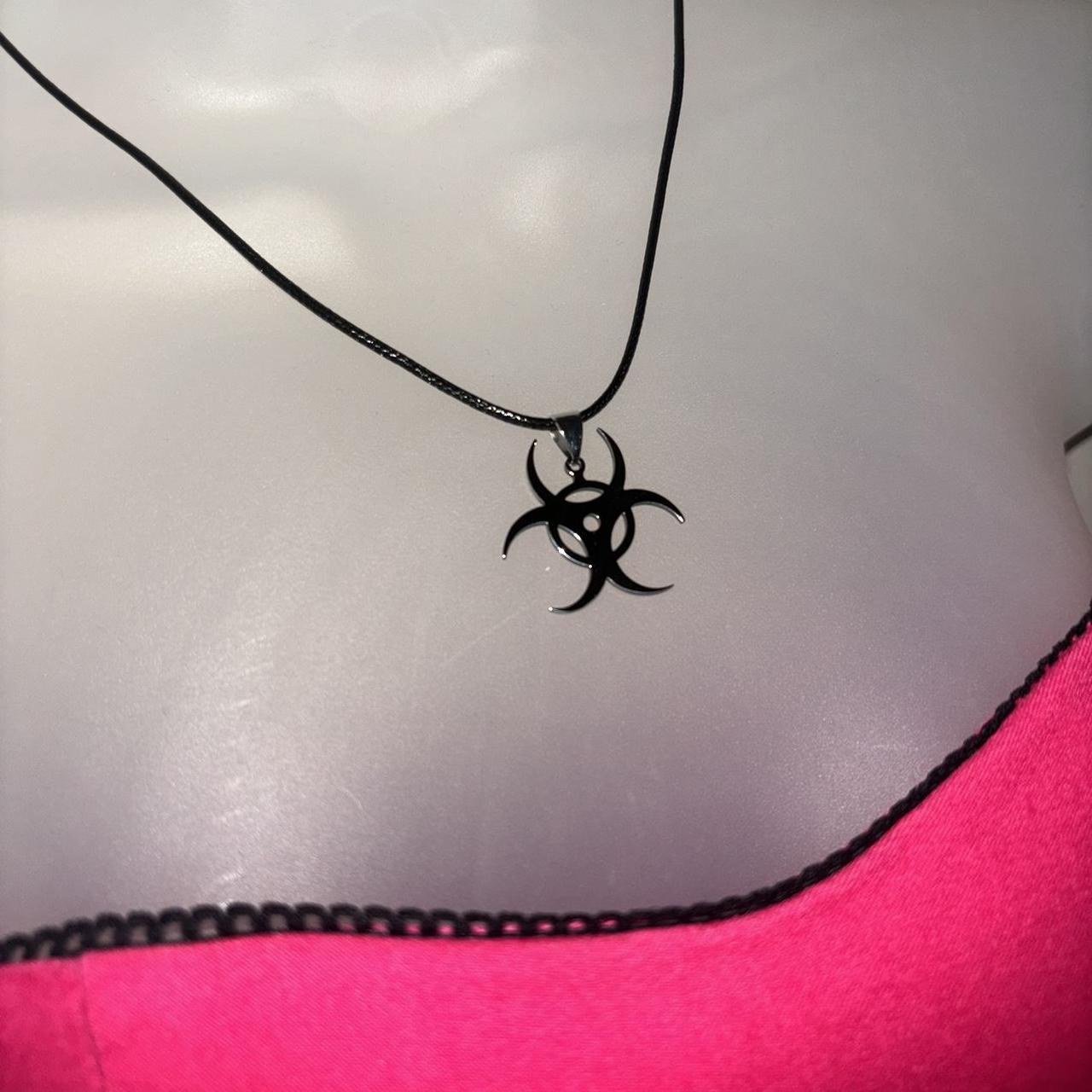 Biohazard necklace ☣️ Firm on price Super cute... - Depop