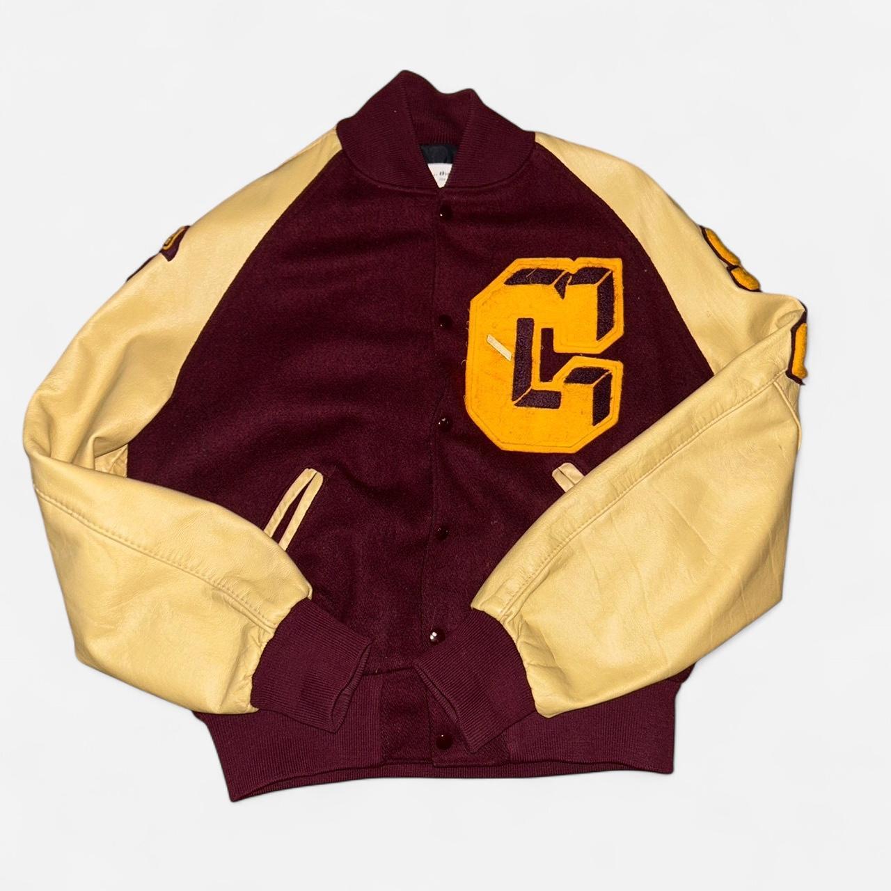 Burgundy varsity jacket with beige sleeves Fits... | Depop