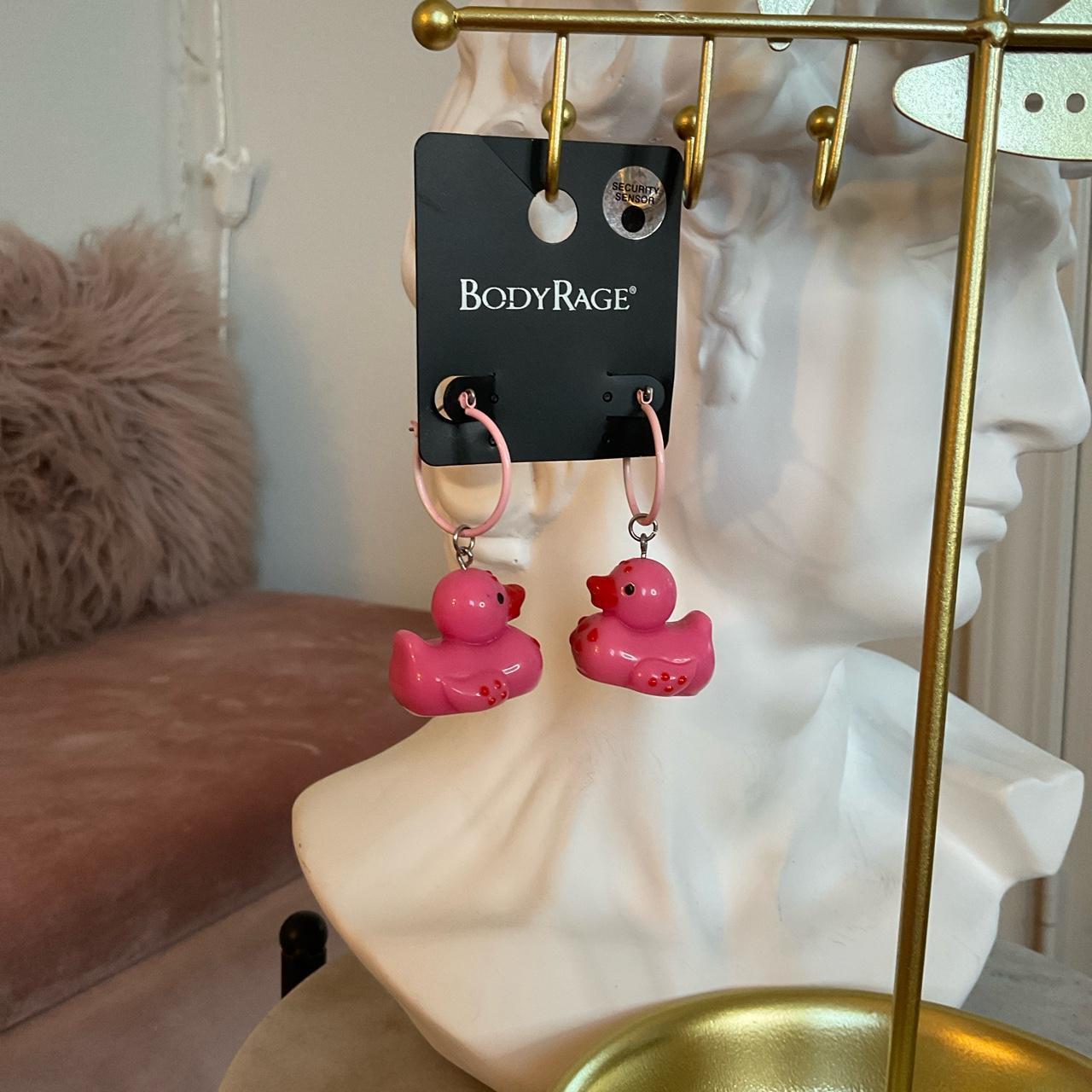 Spencer’s body rage pink rubber ducky hoop... - Depop