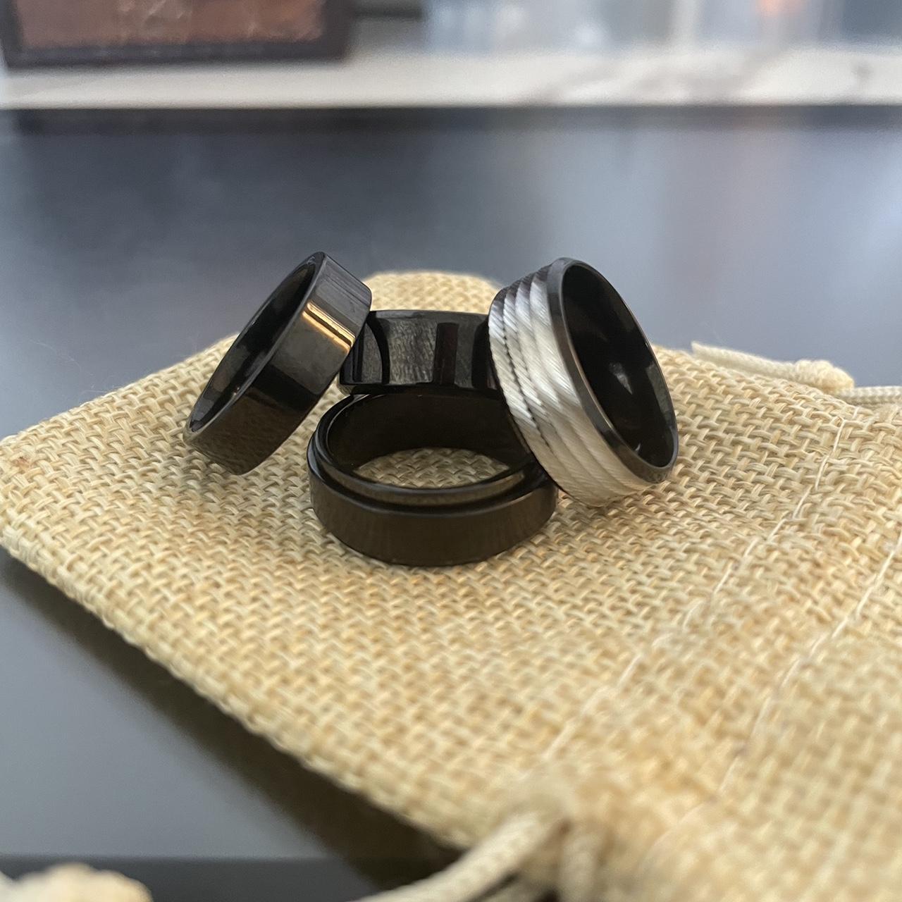 4 piece Men's Trendy Black Rotatable Rings,... - Depop