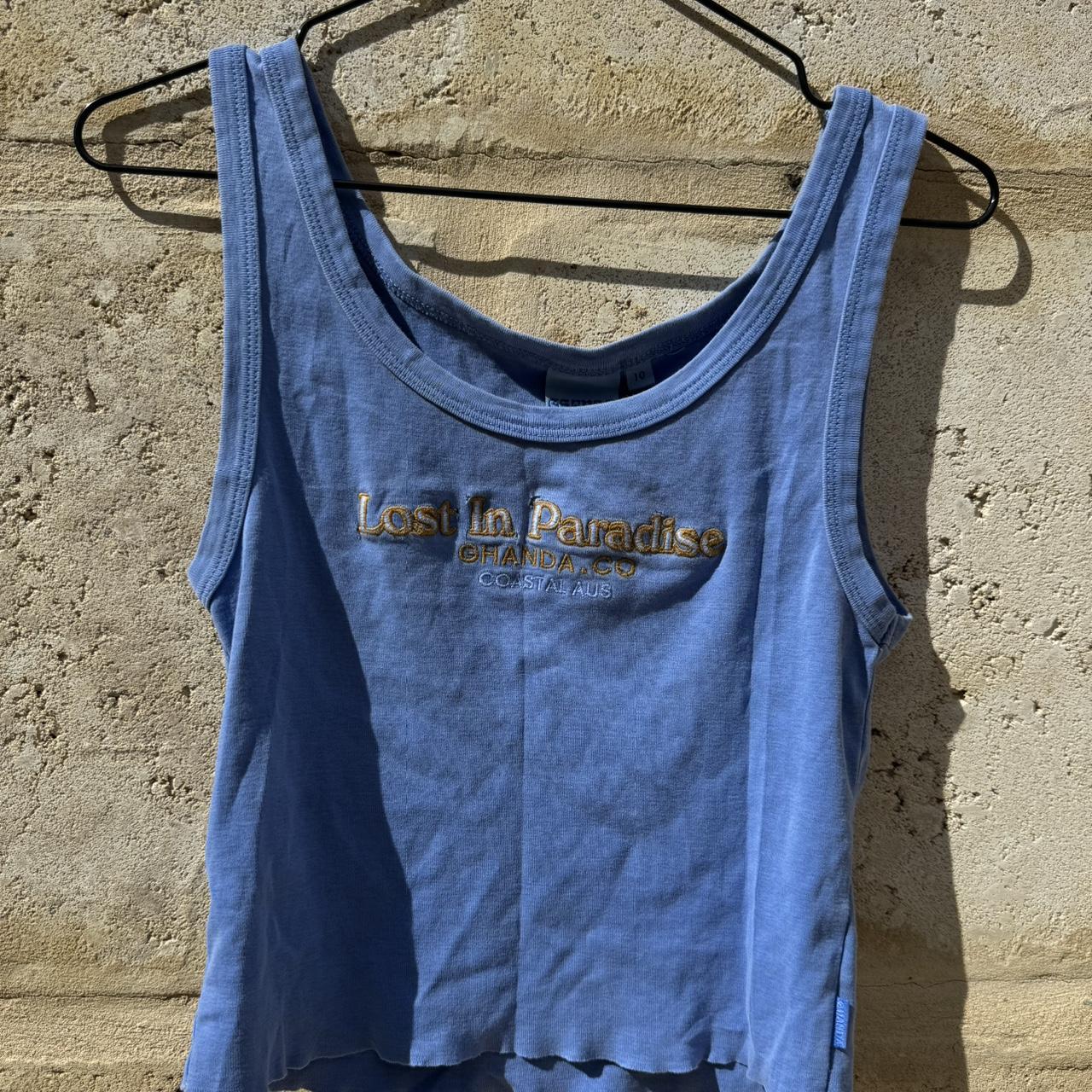 Ghanda Size 8 Singlet Small tare around the logo... - Depop