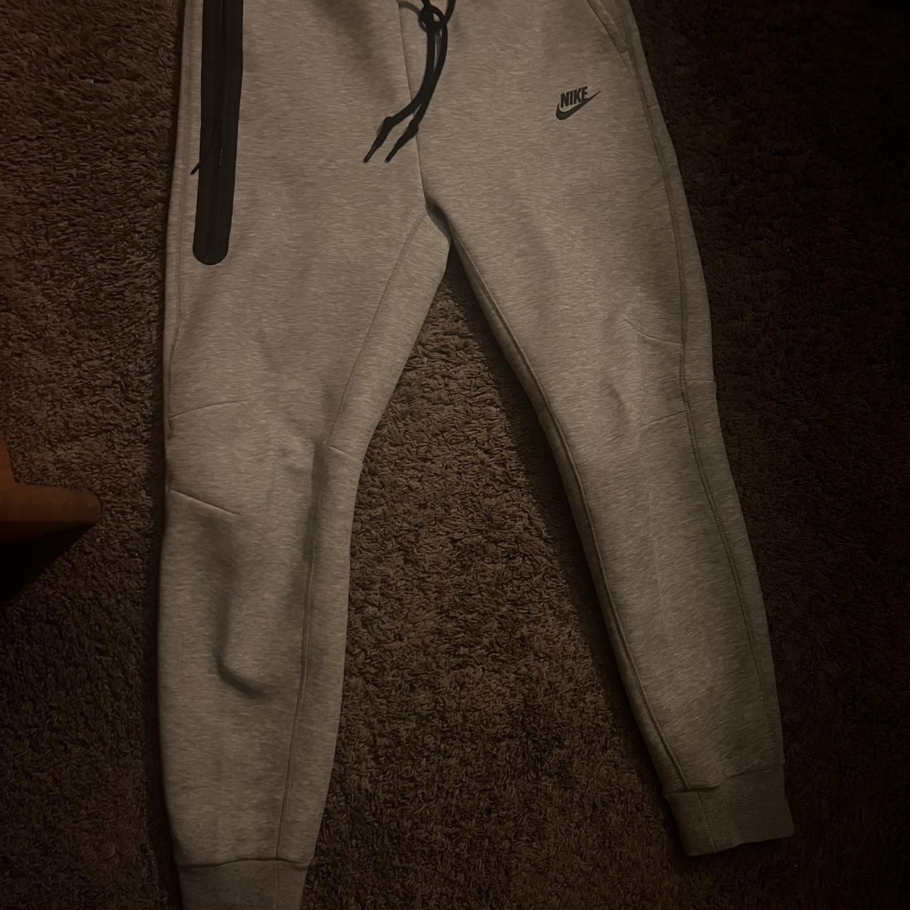 grey nike tech pants mens medium - Depop