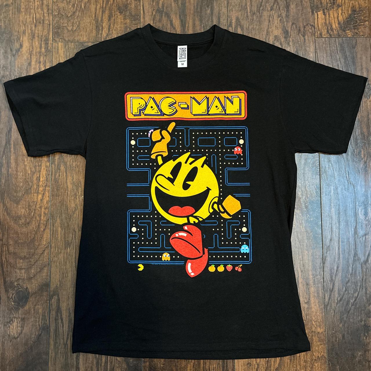 Black Pac-Man short sleeve tee with multi-coloured... | Depop